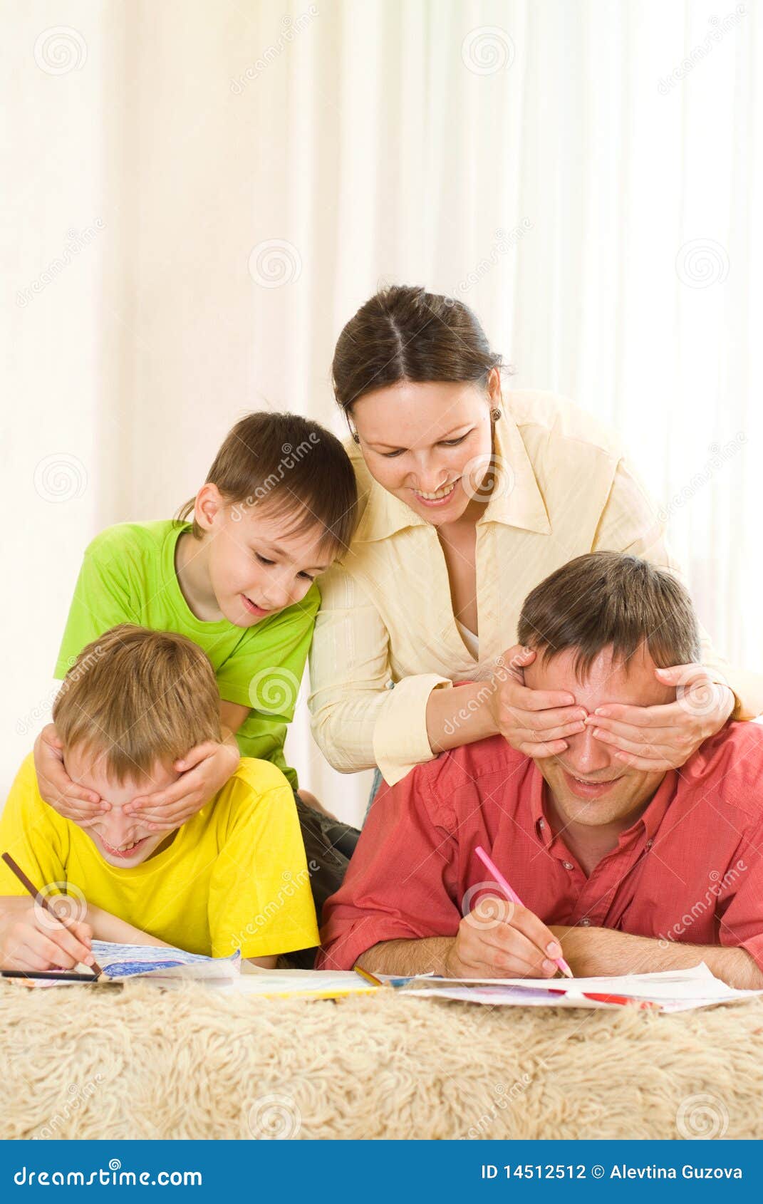 Family on the carpet stock photo. Image of mother, paint - 14512512