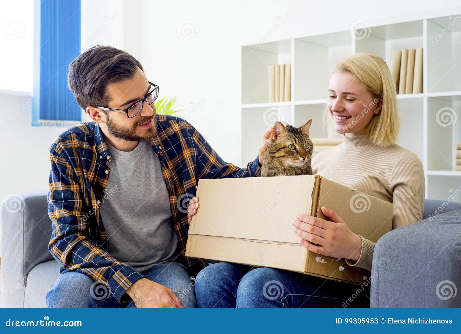 Family with a cat stock image. Image of parenting, adult - 99305953