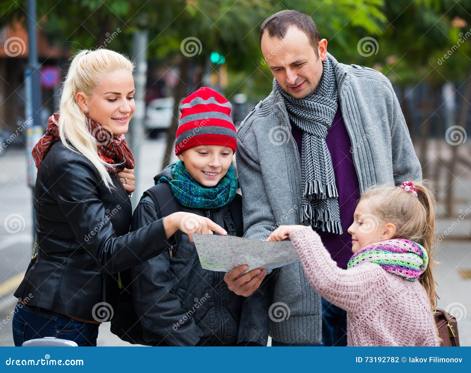 Family Checking Direction in Map Stock Photo - Image of caucasian ...