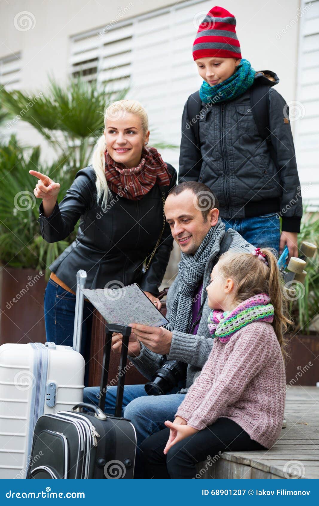 Family Checking Direction in Map Stock Image - Image of parents, bags ...