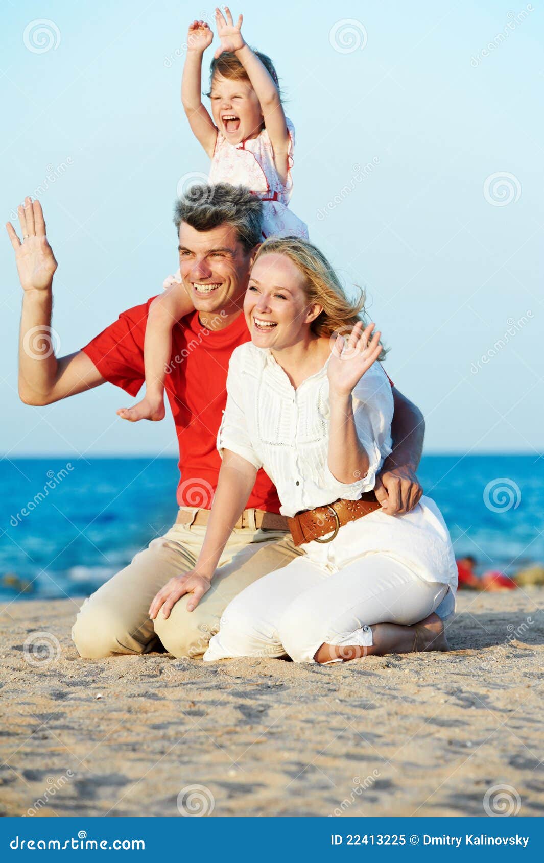 Family with Child at Sea Beach Stock Image - Image of smile, playful ...