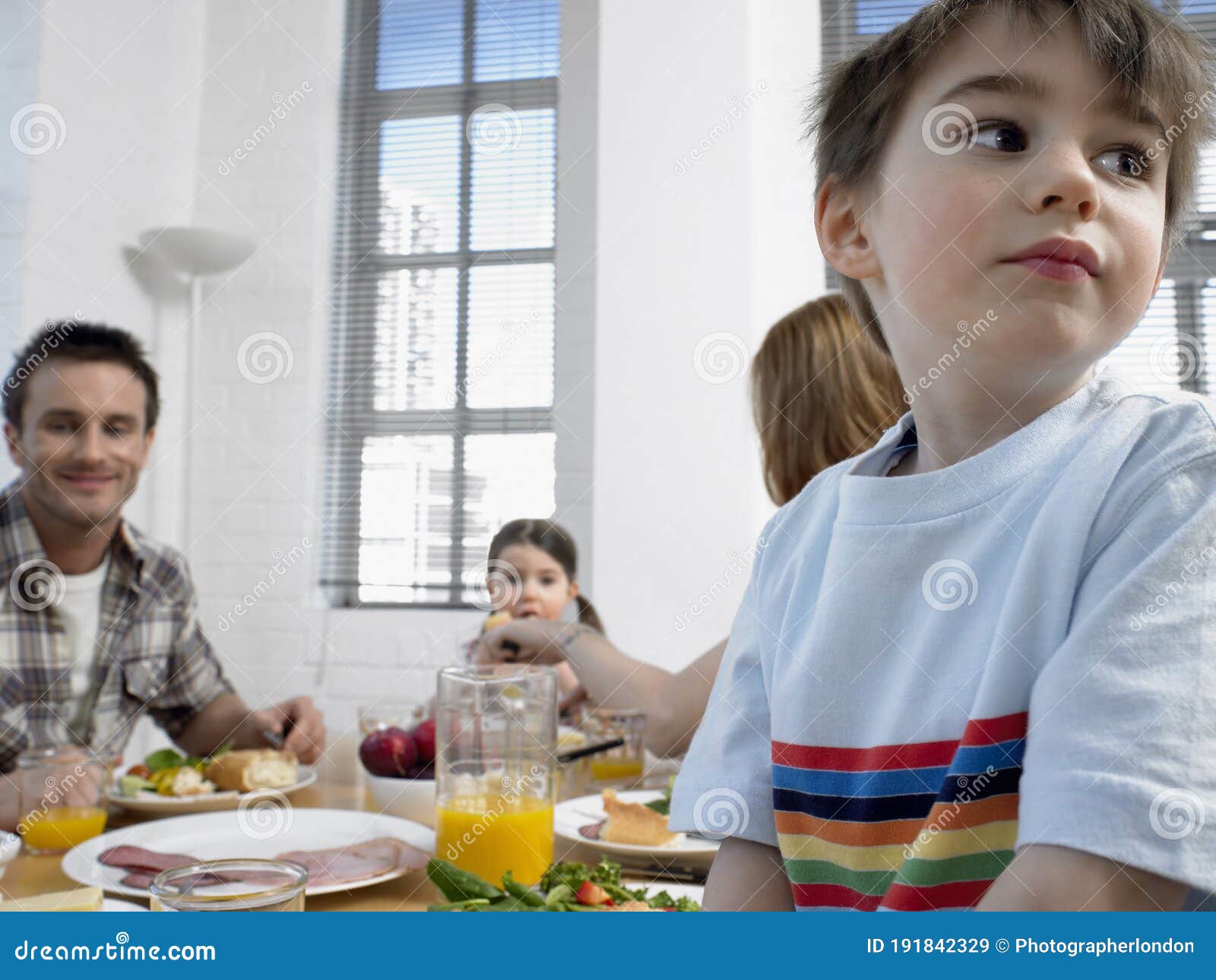 Portrait of Happy Family Eating on Dining Table Together Stock Image ...