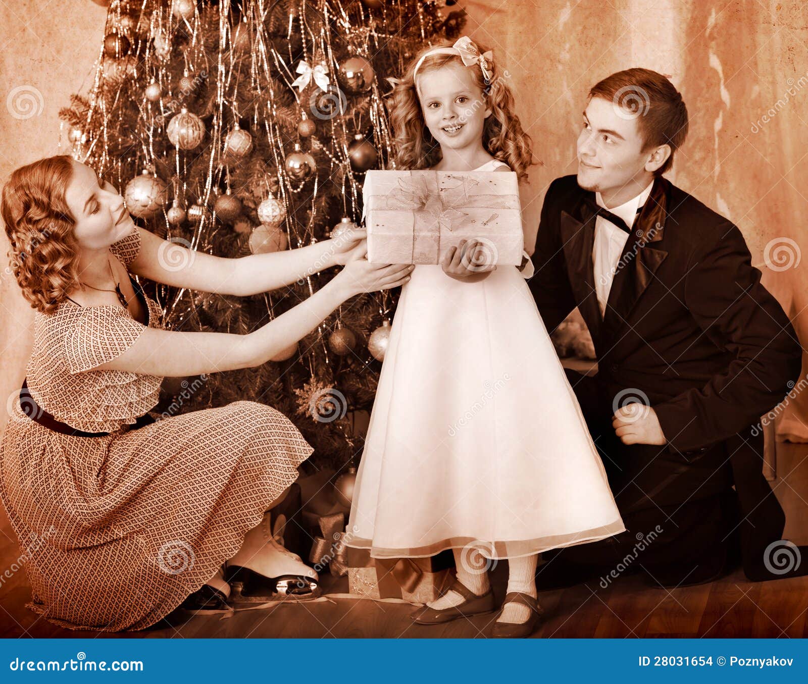 Family with Children Dressing Christmas Tree. Stock Photo - Image of ...