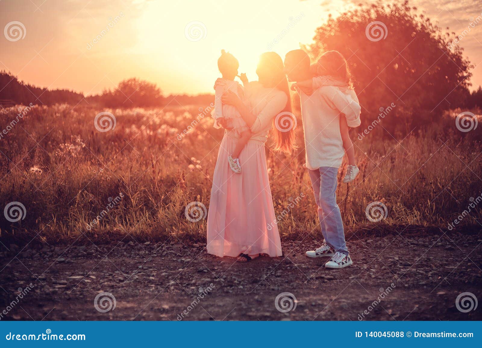 Family with Children at Sunset Stock Photo - Image of child, daughter ...