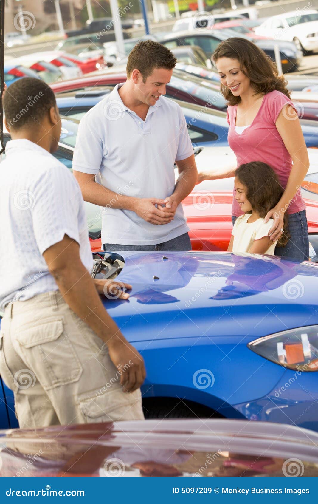 Family choosing new car stock image. Image of family, dealership - 5097209