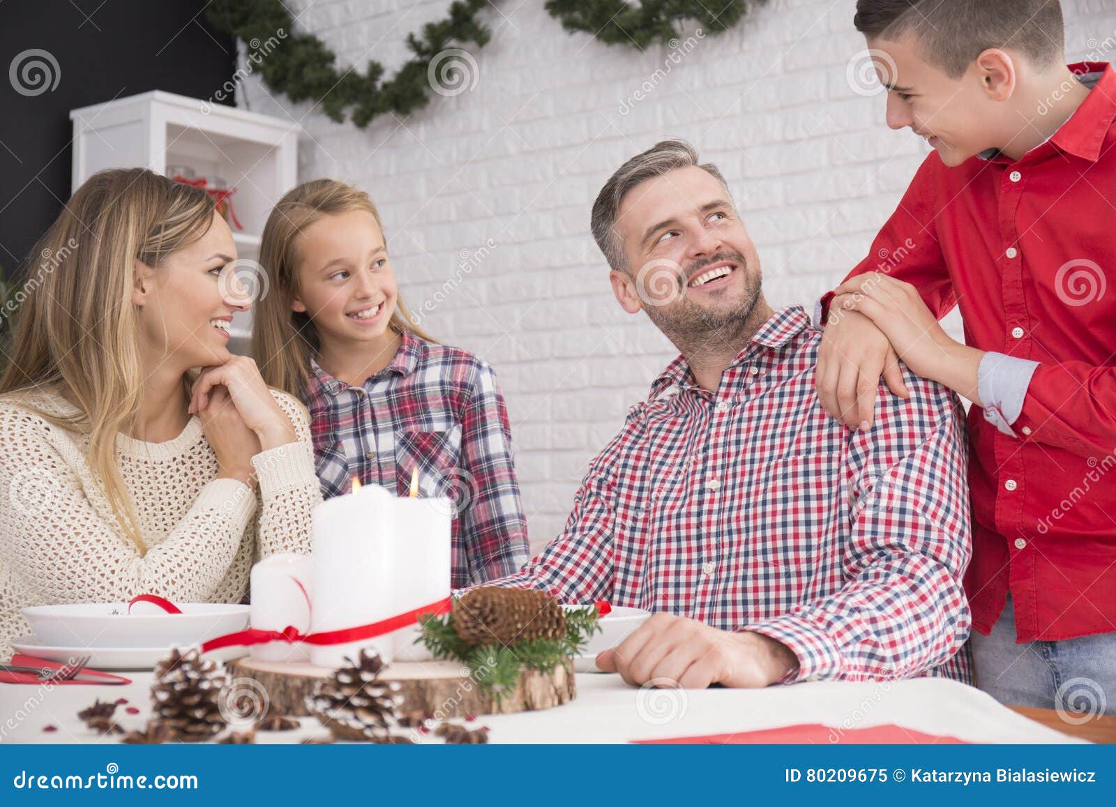 Family in Christmas Dining Room Stock Image - Image of white, together ...