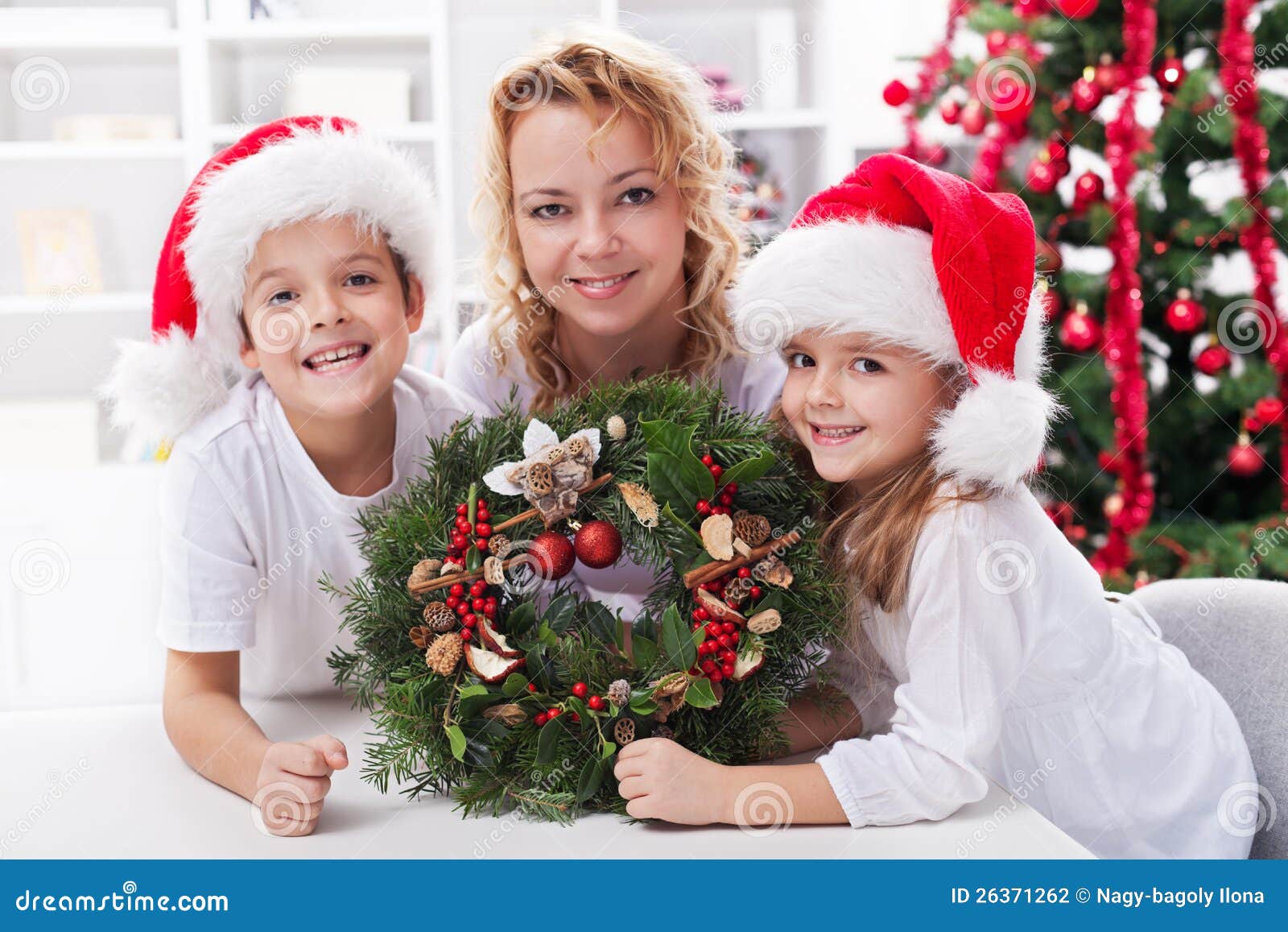 Family at christmas time stock photo. Image of celebration - 26371262