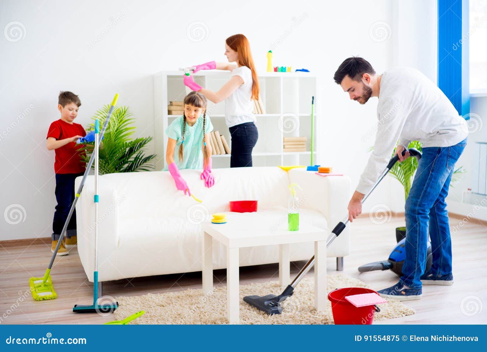 Family Cleaning Up Together
