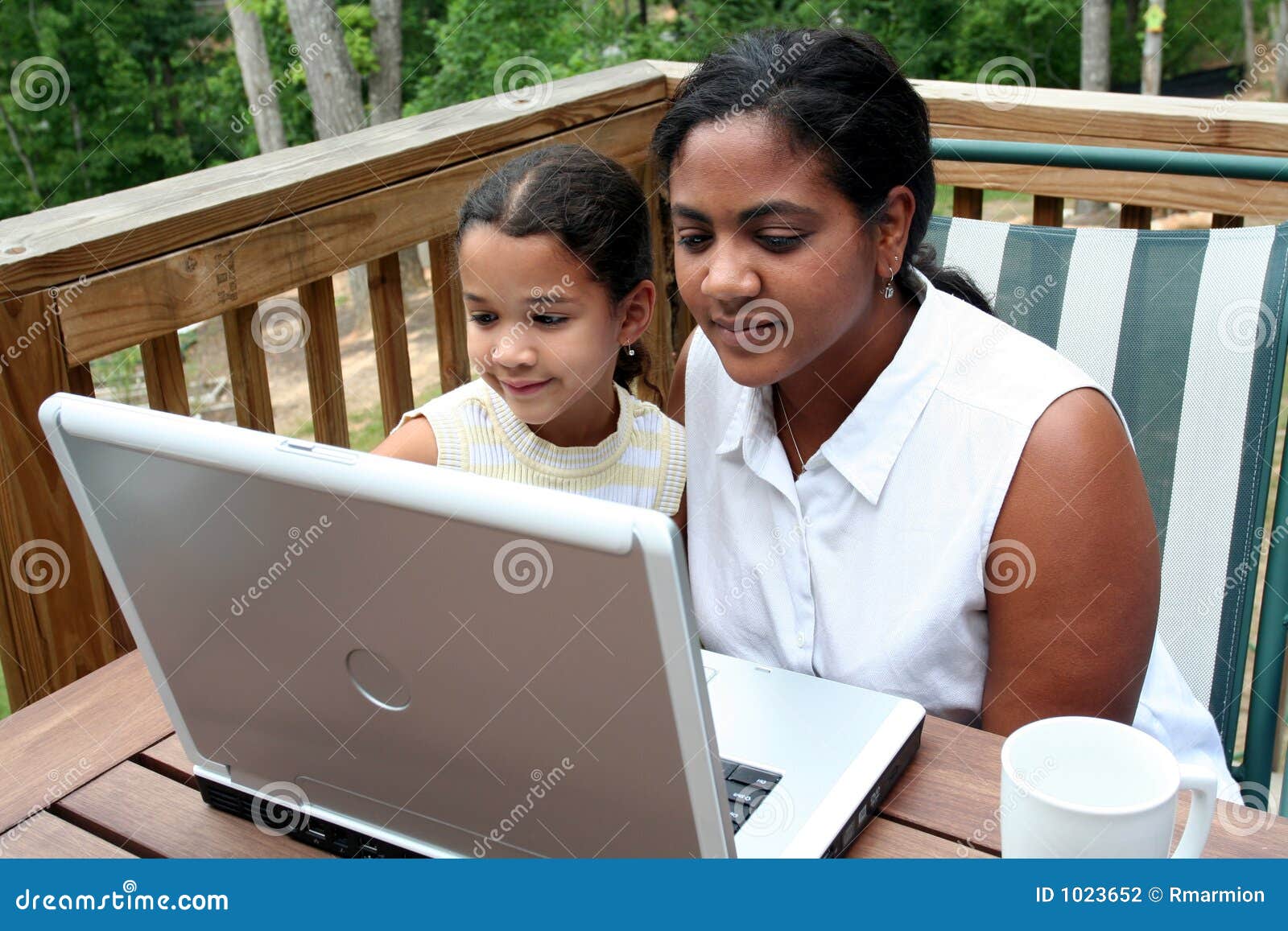 Family on Computer stock photo. Image of family, interracial - 1023652