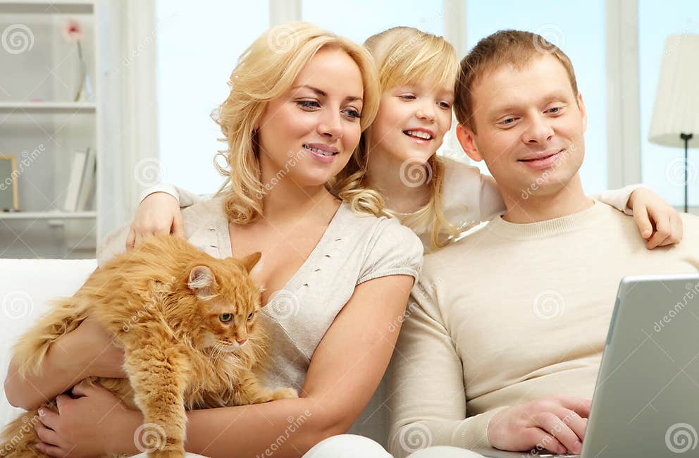Family with computer stock photo. Image of family, people - 18591580