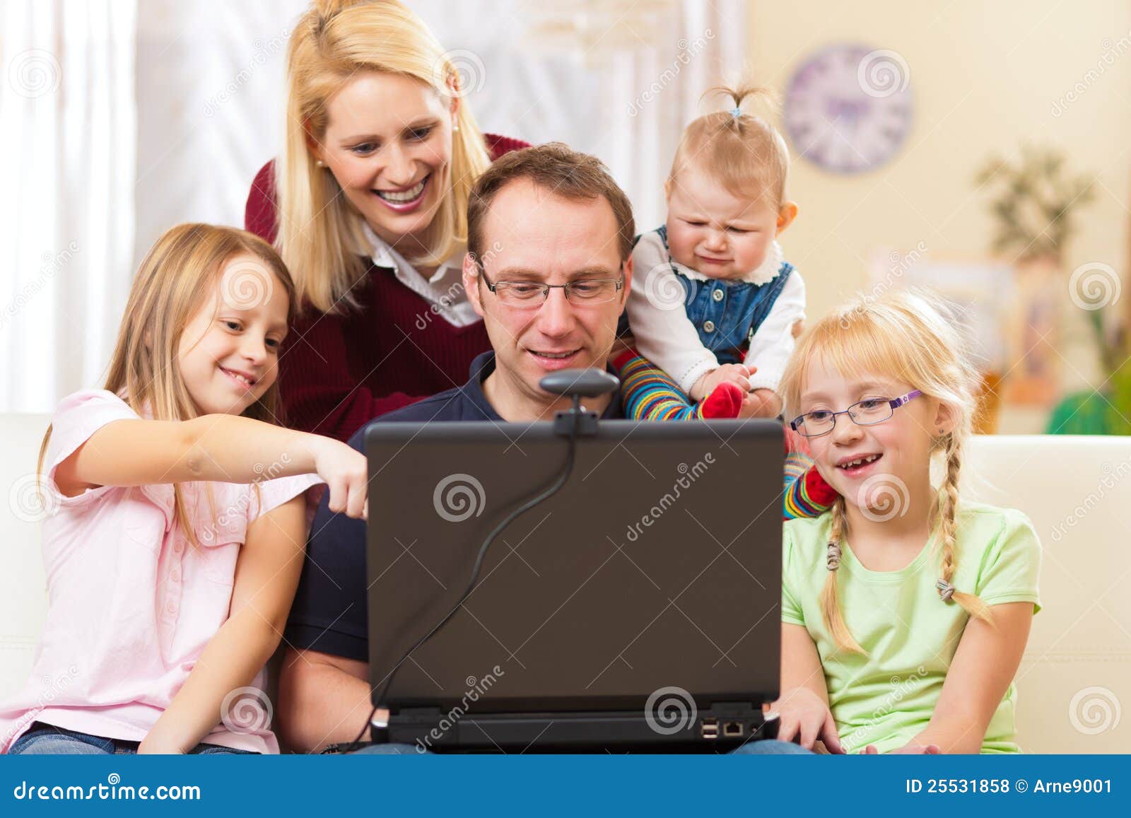 Family with Computer Having Video Conference Stock Photo - Image of ...