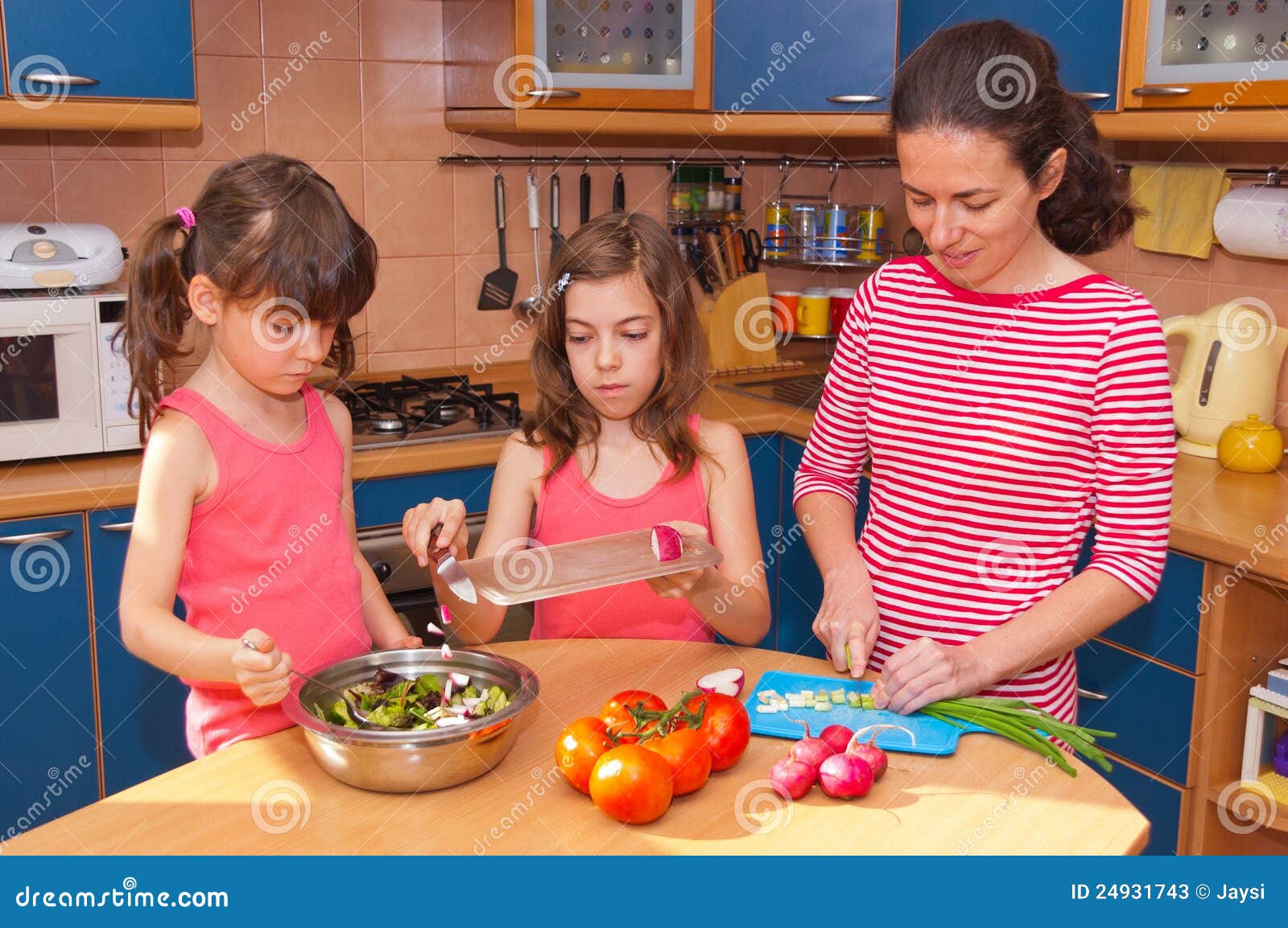 Family cooking at home stock image. Image of cute, daughter - 24931743