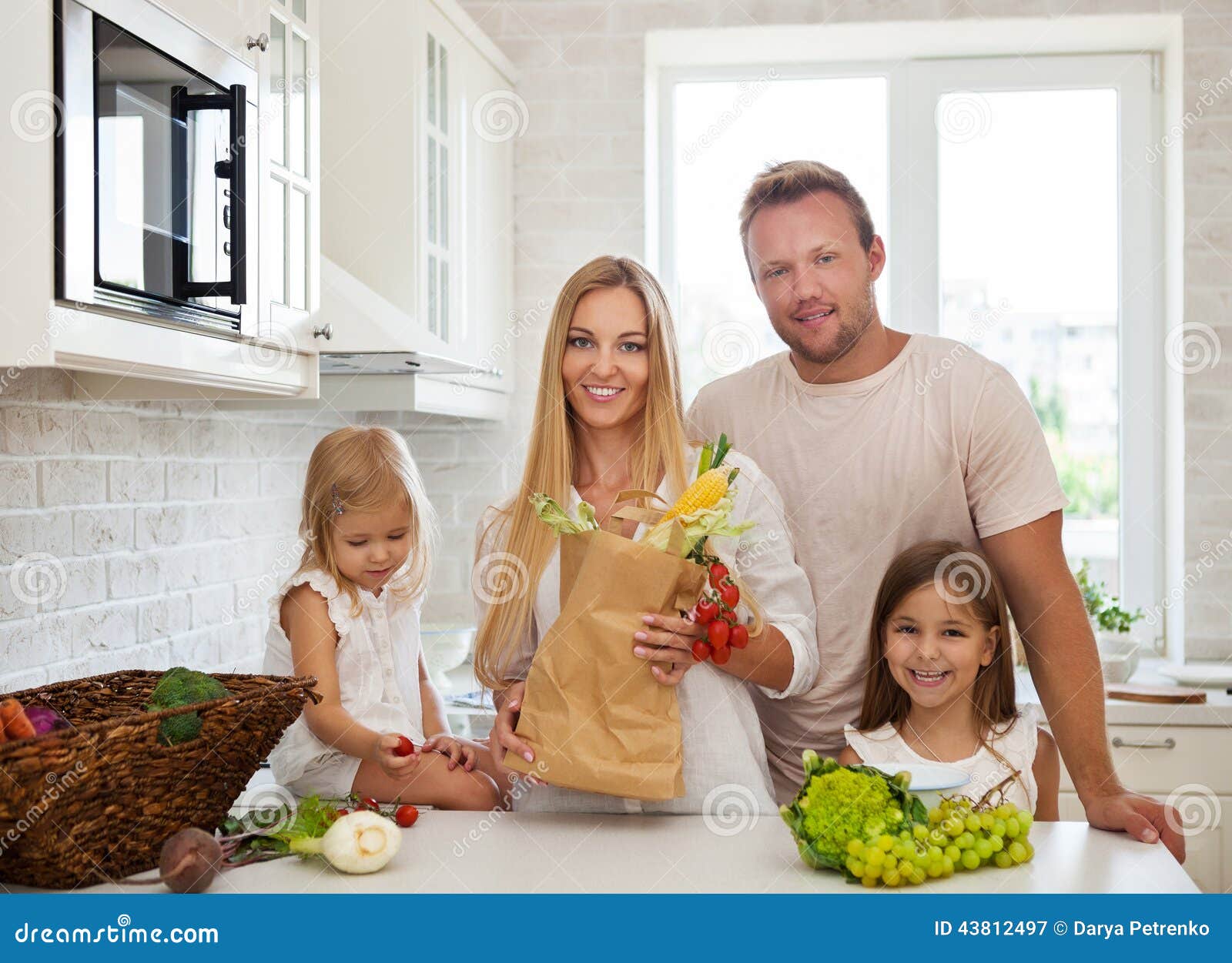 Family Cooking in a Modern Kitchen Setting Stock Image - Image of male ...