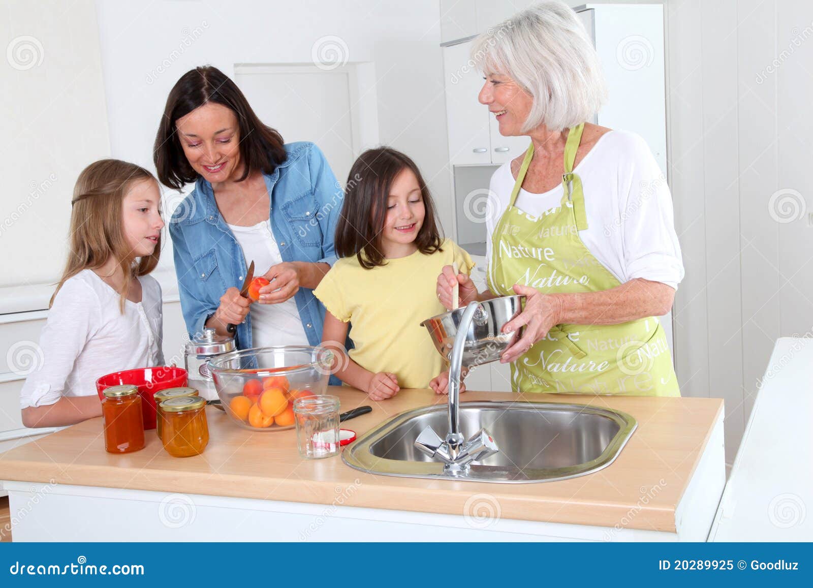 Family cooking together stock image. Image of kitchen - 20289925