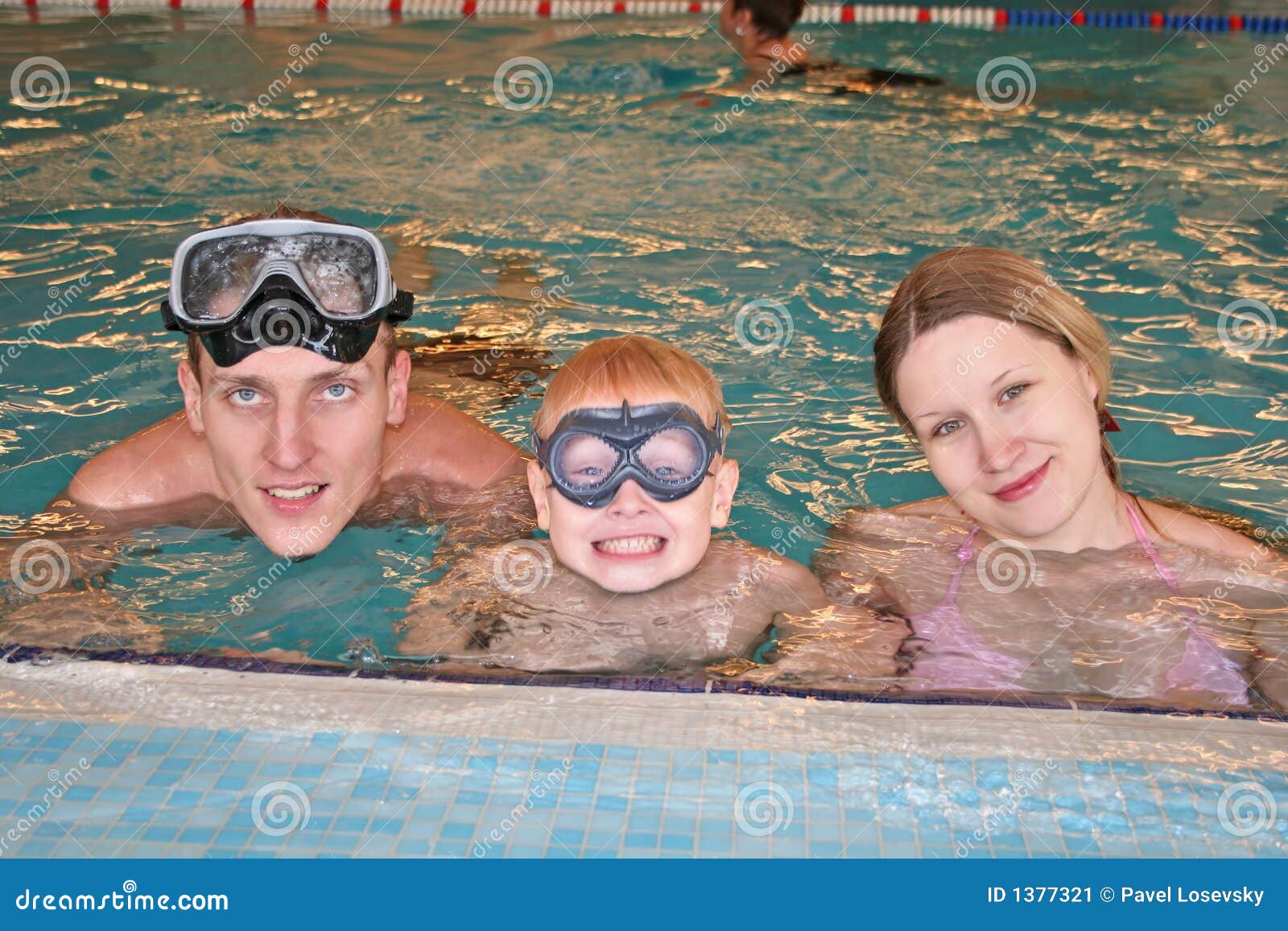 Family in covered pool stock image. Image of papa, people - 1377321