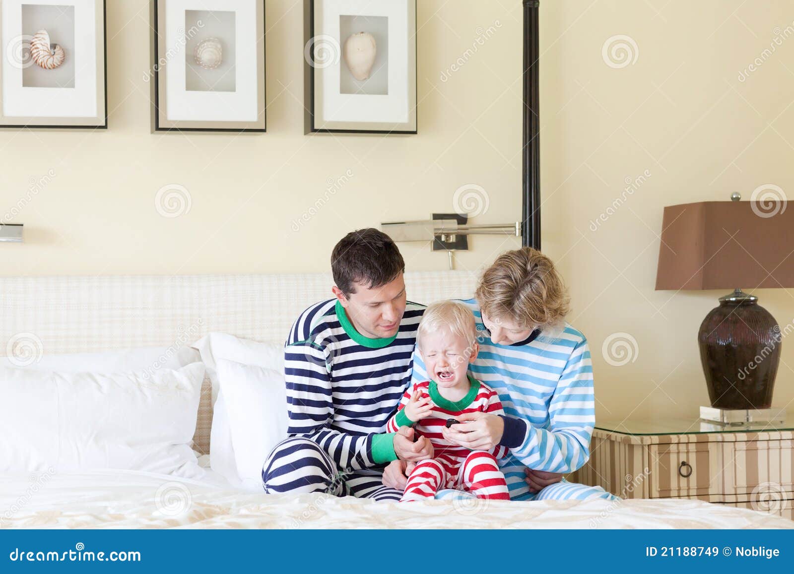 Family with crying toddler stock image. Image of male - 21188749