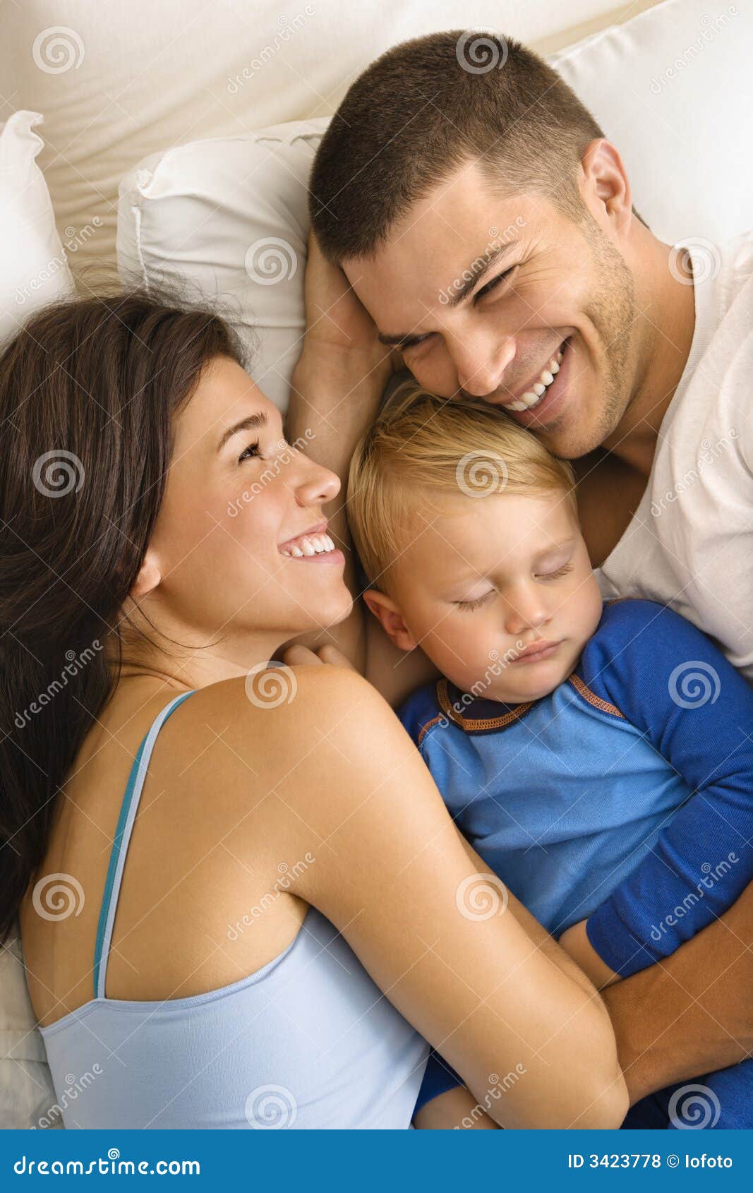 Family cuddling. stock photo. Image of lying, affection - 3423778