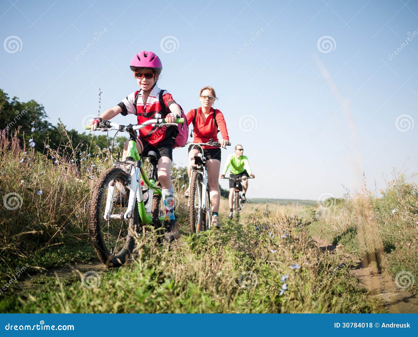 Family cycling outdoors stock photo. Image of father - 30784018