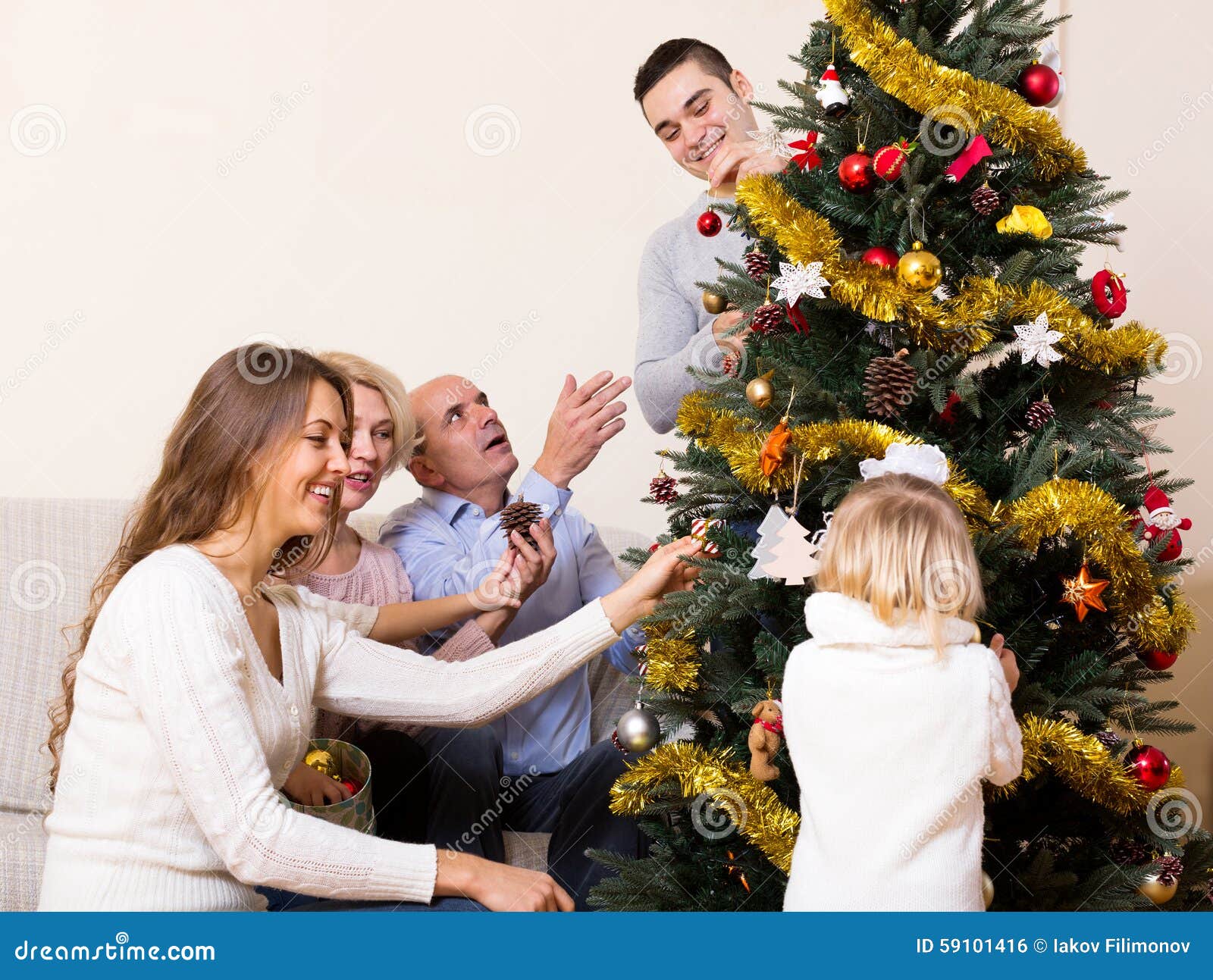 Family with Decorated Christmas Tree Stock Photo - Image of room ...