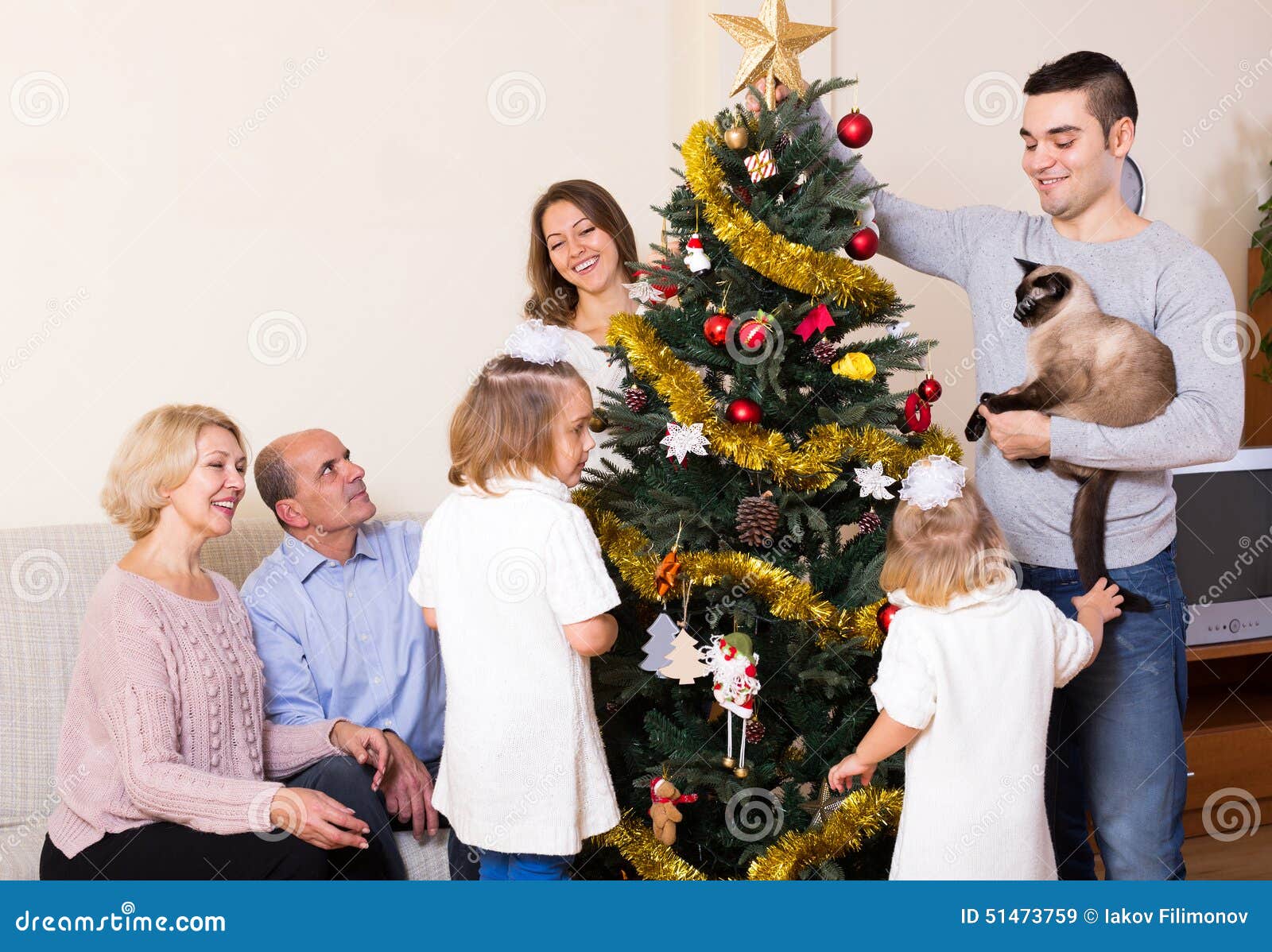 Family with Decorated Christmas Tree Stock Image - Image of christmas ...
