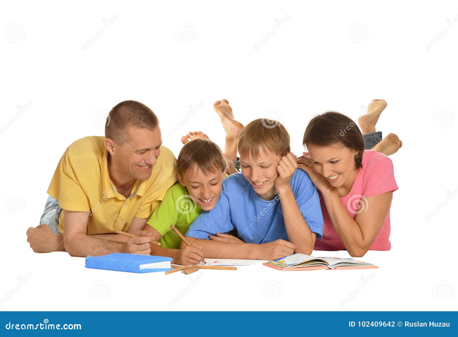 Family Doing Homework Together Stock Photo - Image of male, children ...