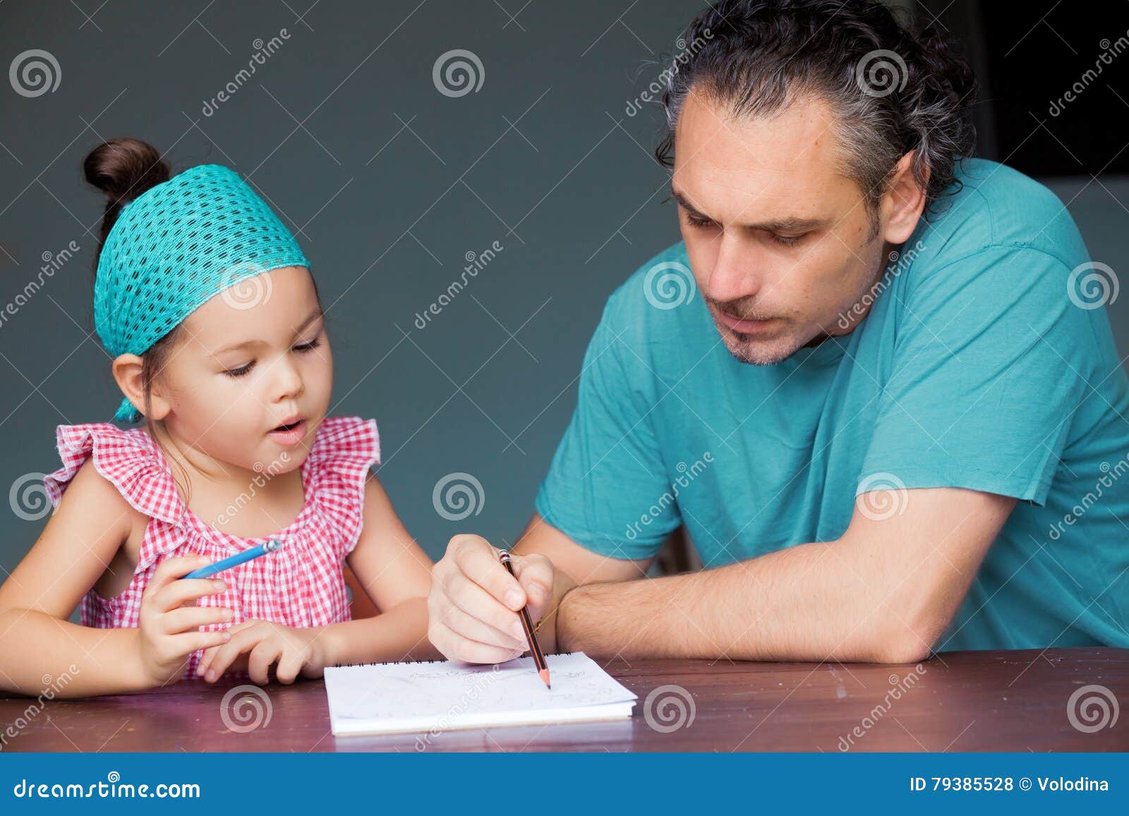 Family Draw and Write Together Stock Photo - Image of education ...