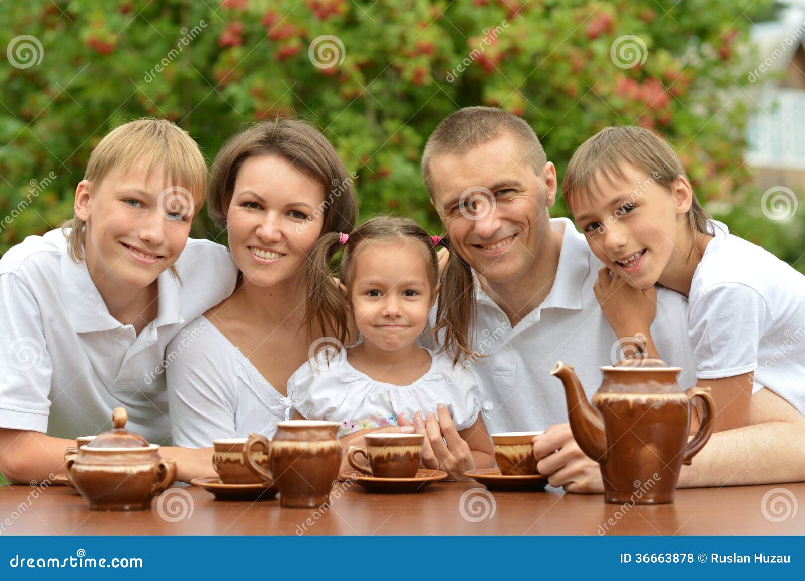 Family Drinking Tea Outdoors Stock Photo - Image of parents, mother ...