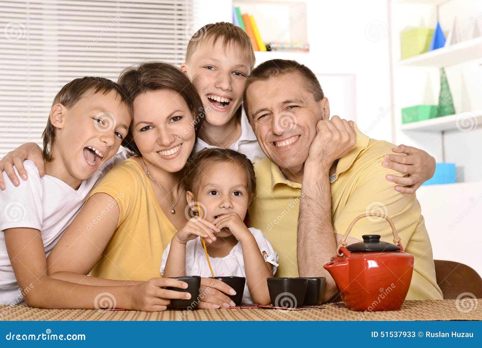 Family drinking tea stock image. Image of attractive - 51537933