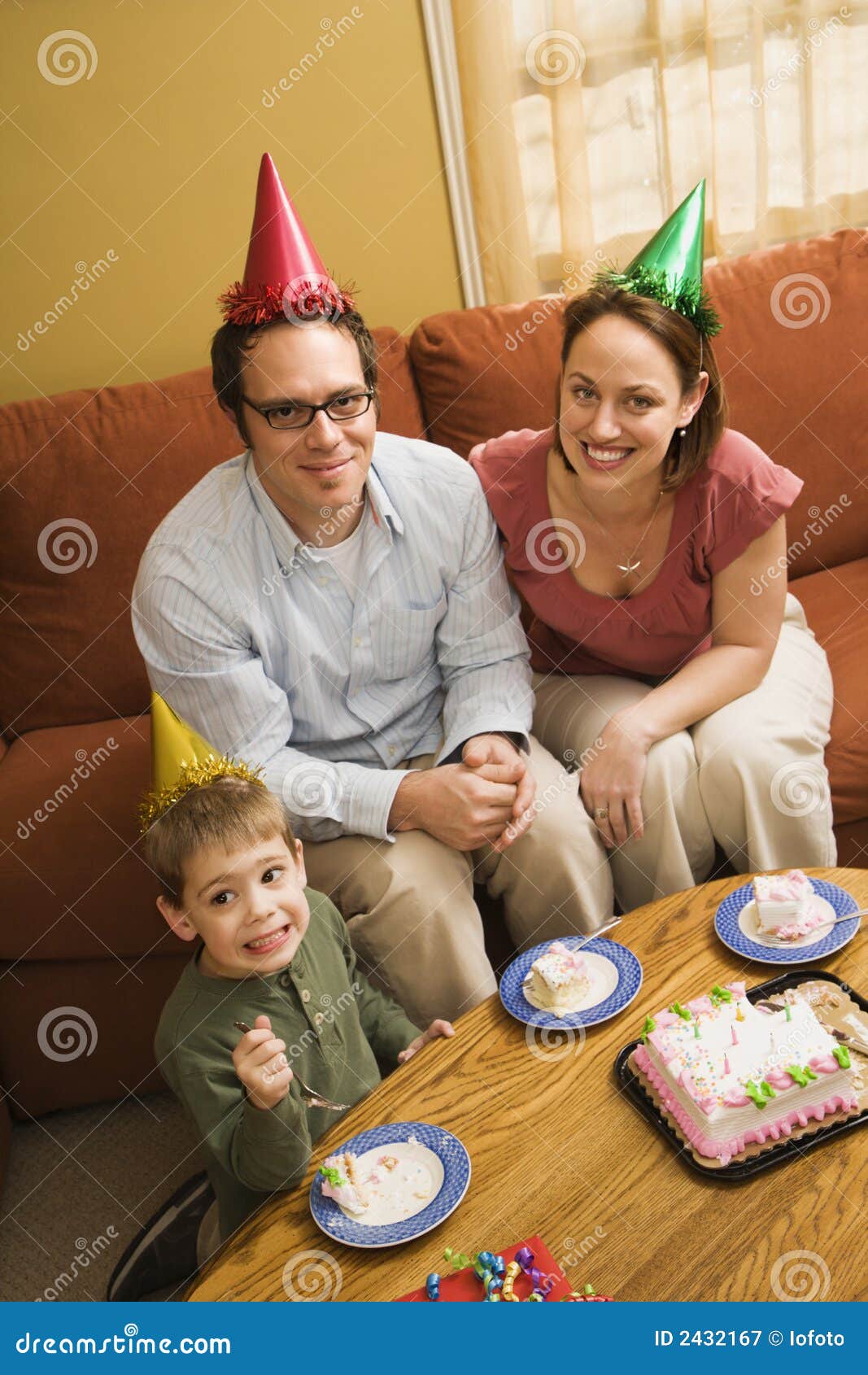 Family Eating Birthday Cake. Stock Image - Image of child, happy: 2432167