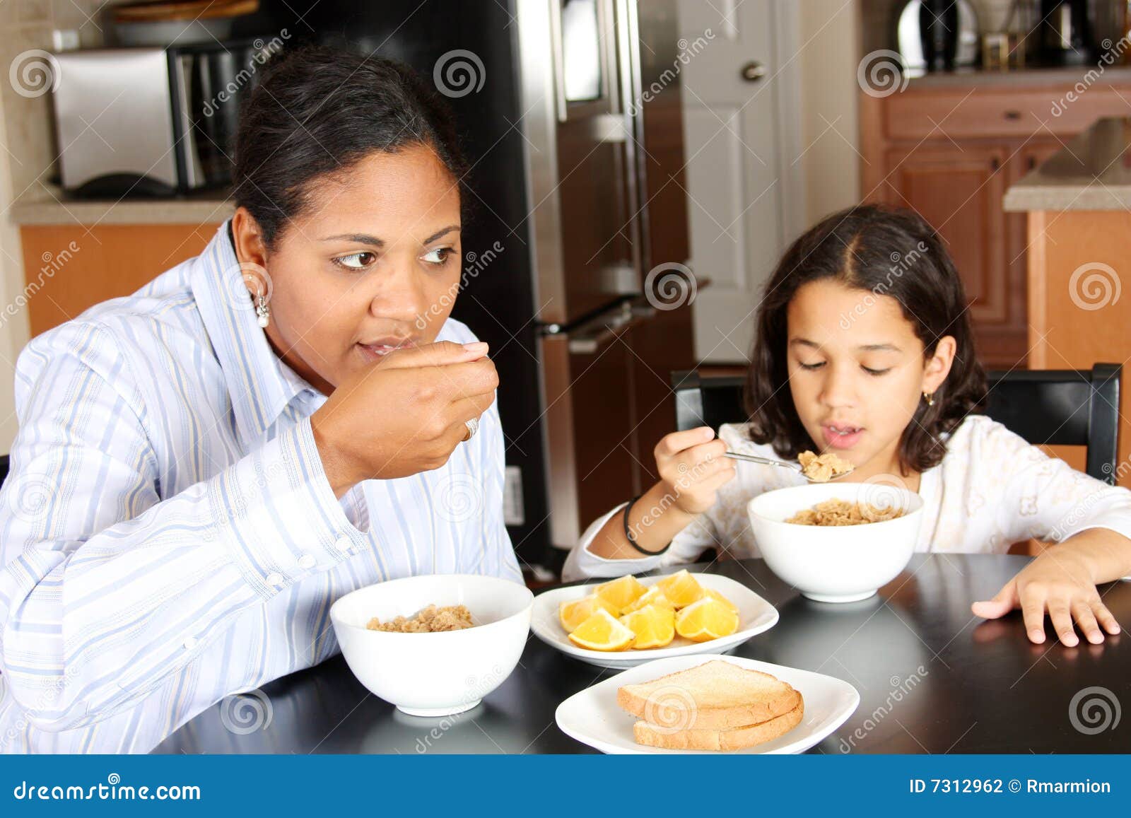 Family Eating Breakfast stock photo. Image of eating, girl - 7312962