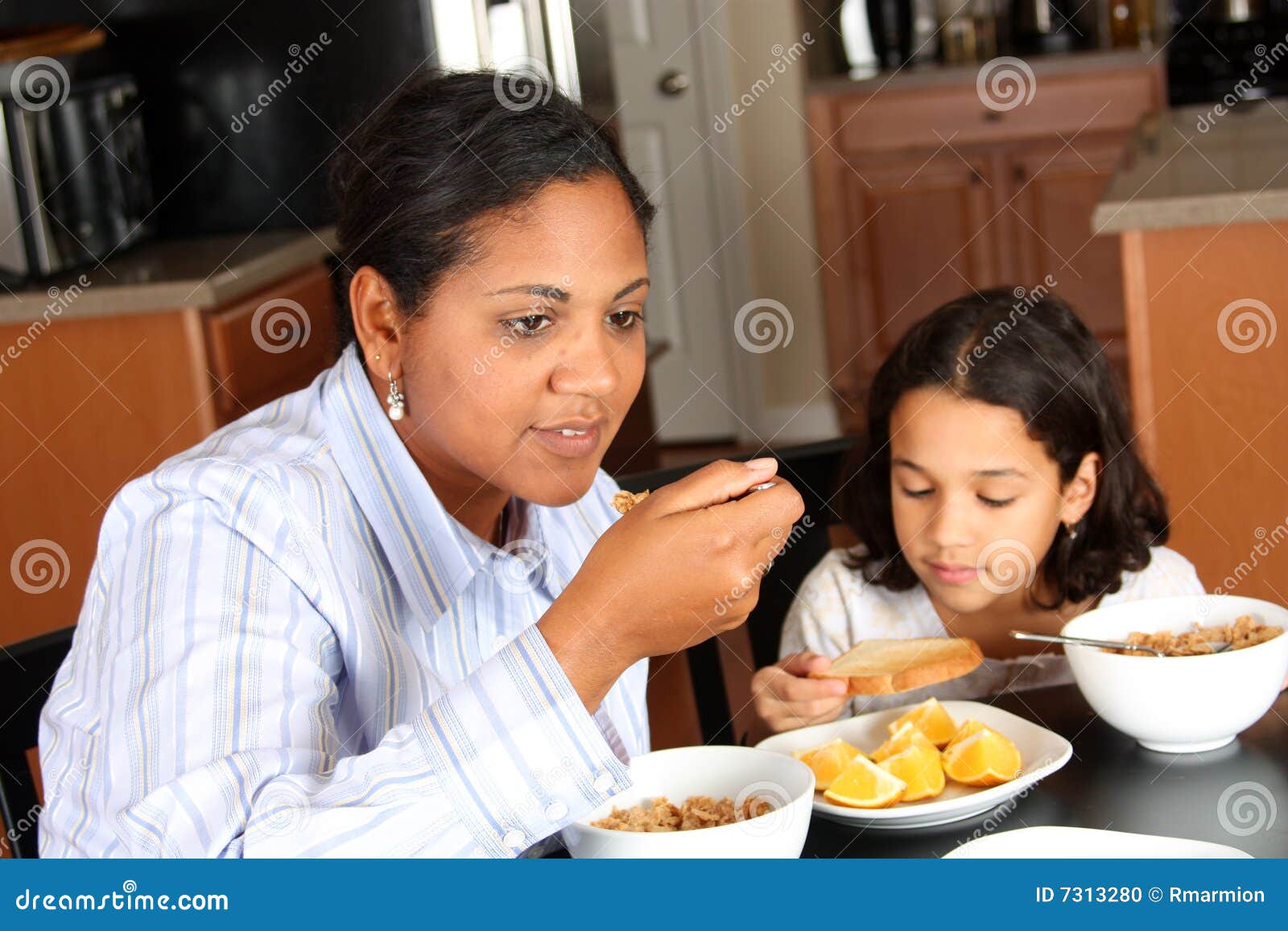 Family Eating Breakfast stock photo. Image of person, daughter - 7313280