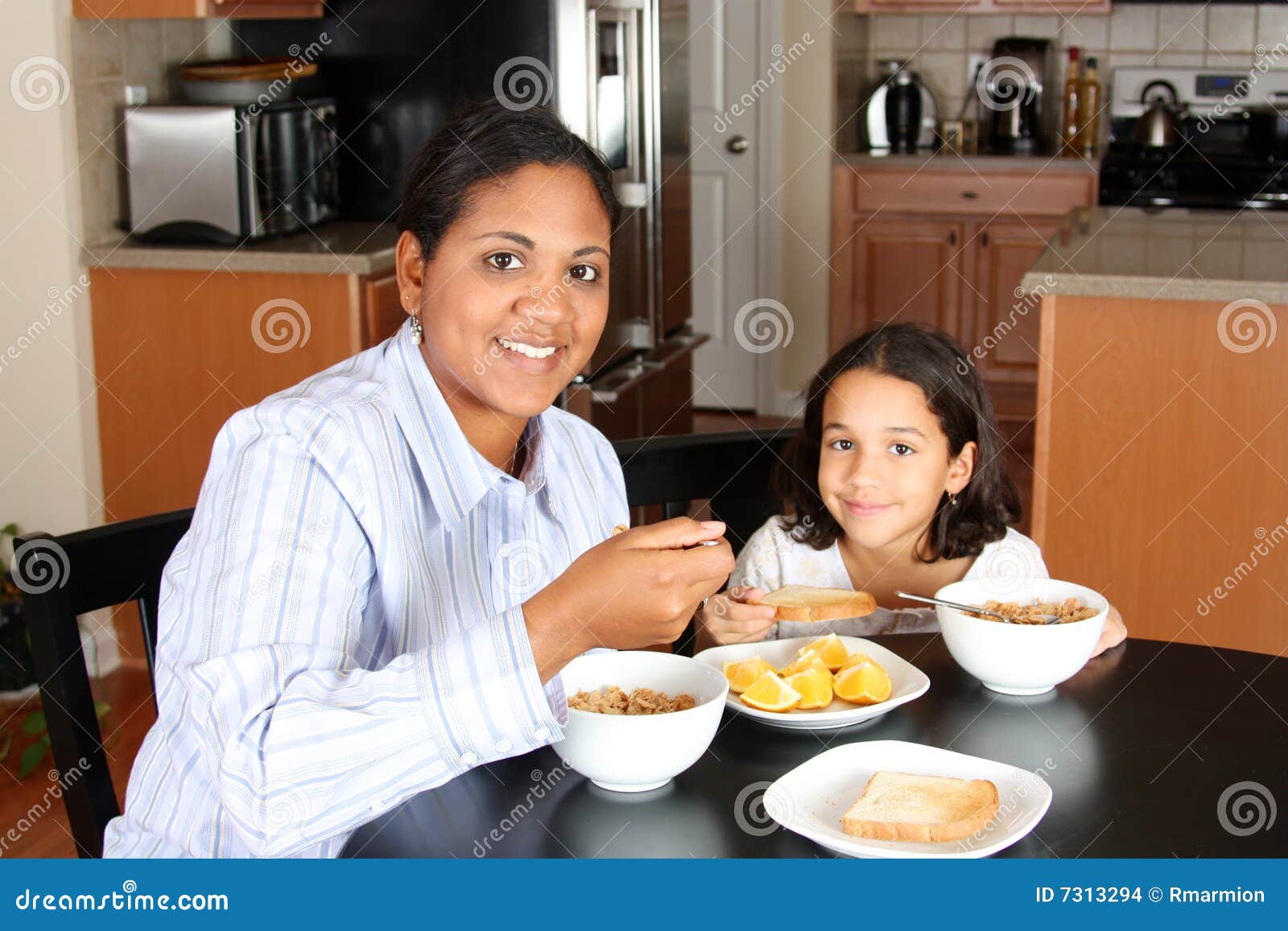 Family Eating Breakfast stock photo. Image of eating, people - 7313294