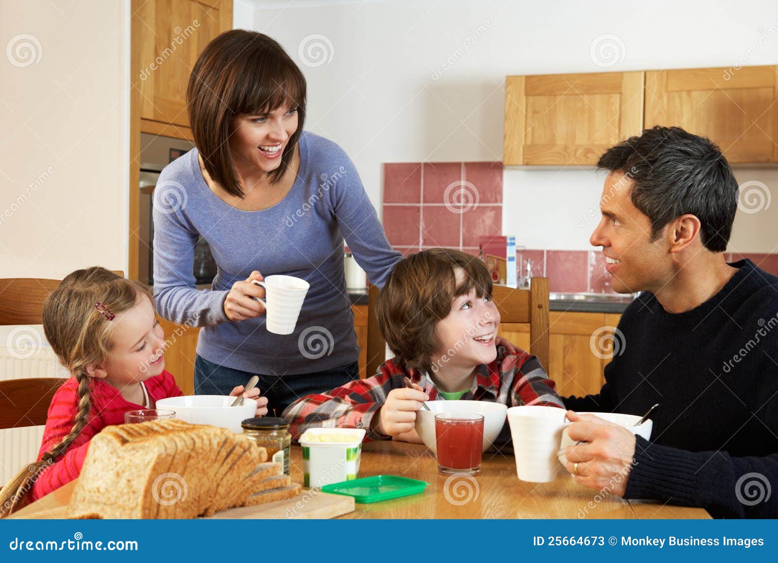 Family Eating Breakfast Together Stock Image - Image of home, cereal ...