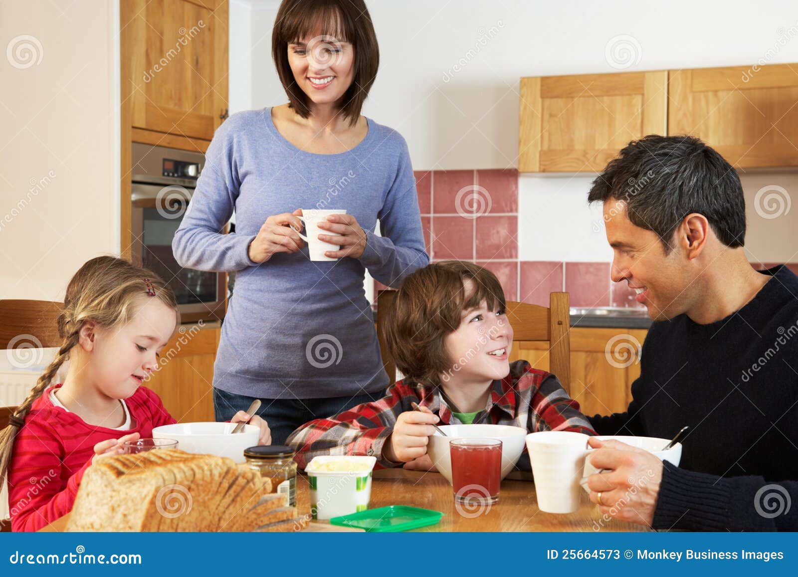 Family Eating Breakfast Together in Kitchen Stock Image - Image of ...