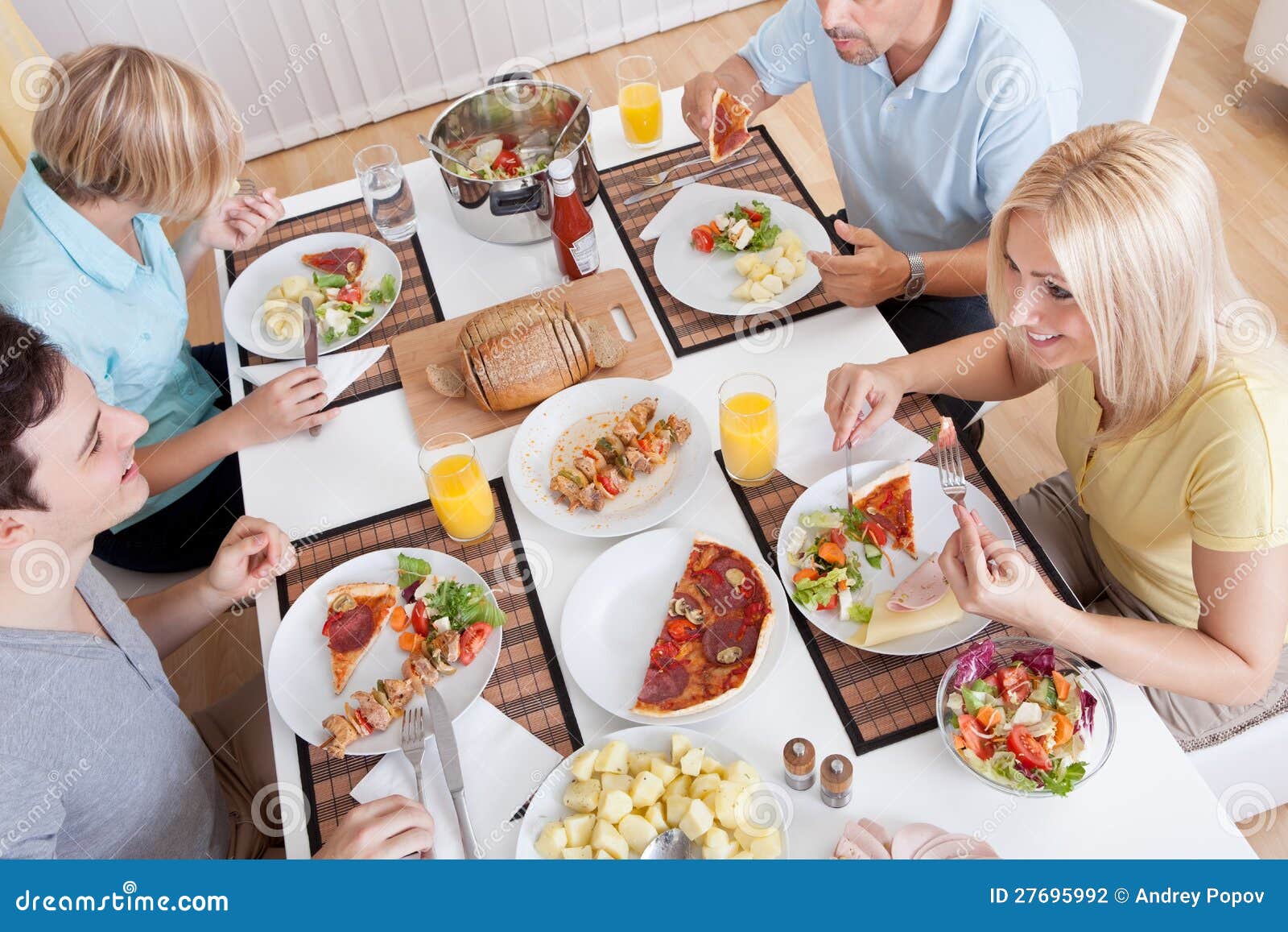 Family Eating a Lunch at Home Stock Photo - Image of dinner, happy ...