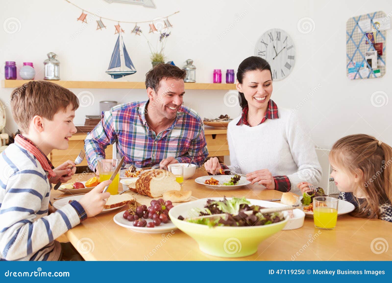 Family Eating Lunch at Kitchen Table Stock Photo - Image of fall ...