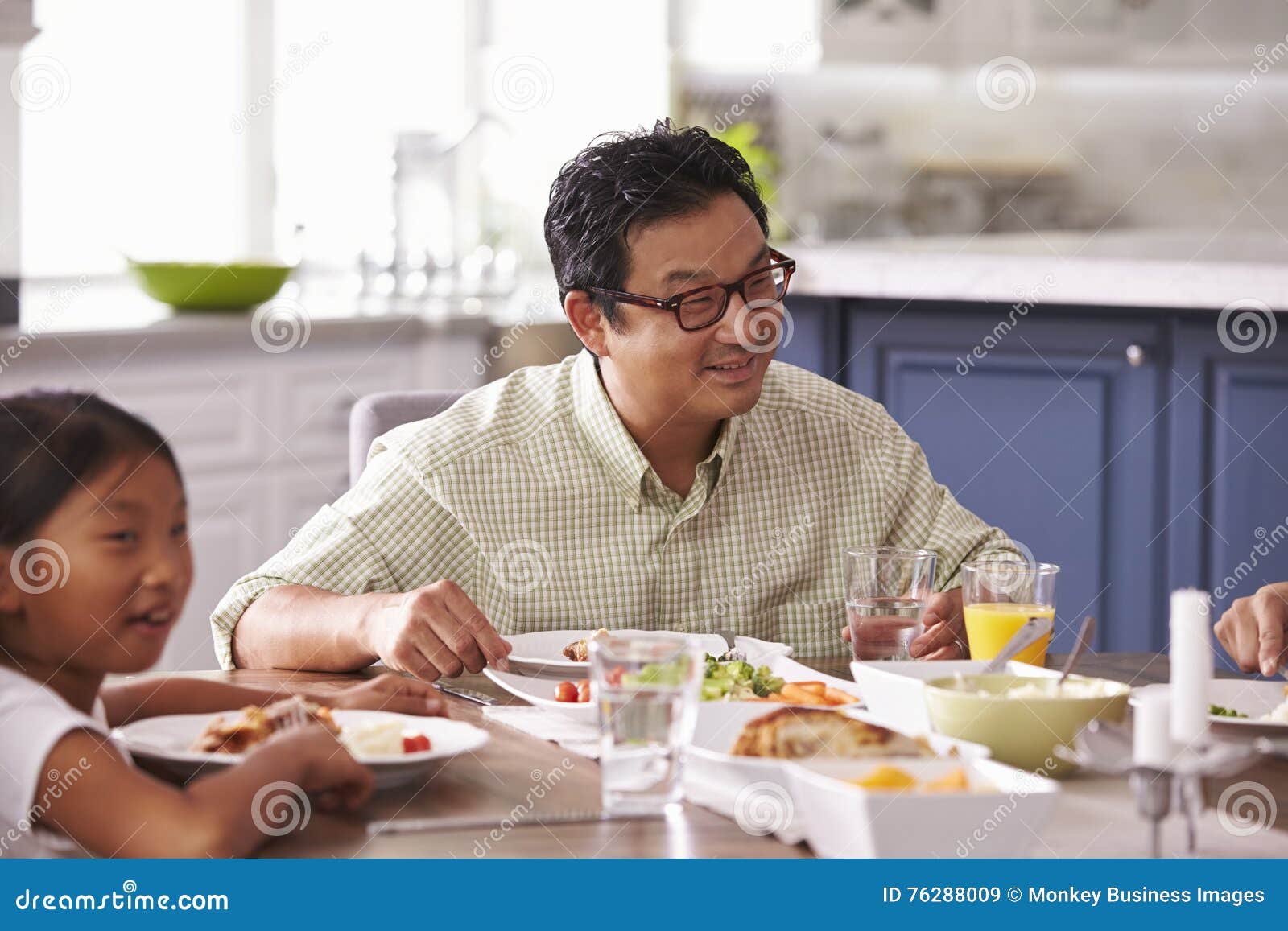 Family Eating Meal at Home Together Stock Image - Image of daughter ...