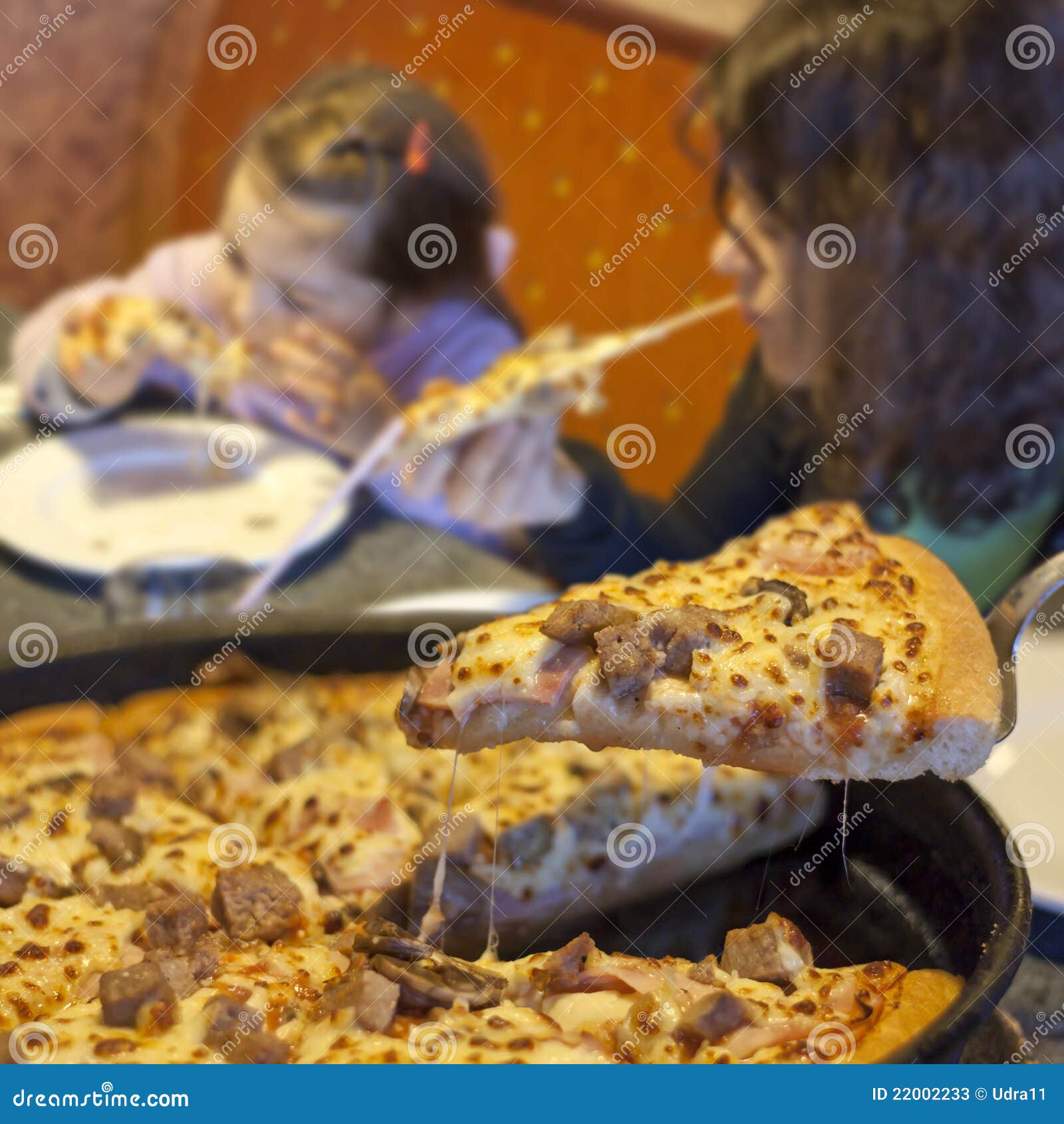 Family Eating Pizza in Restaurant Stock Image - Image of eating ...