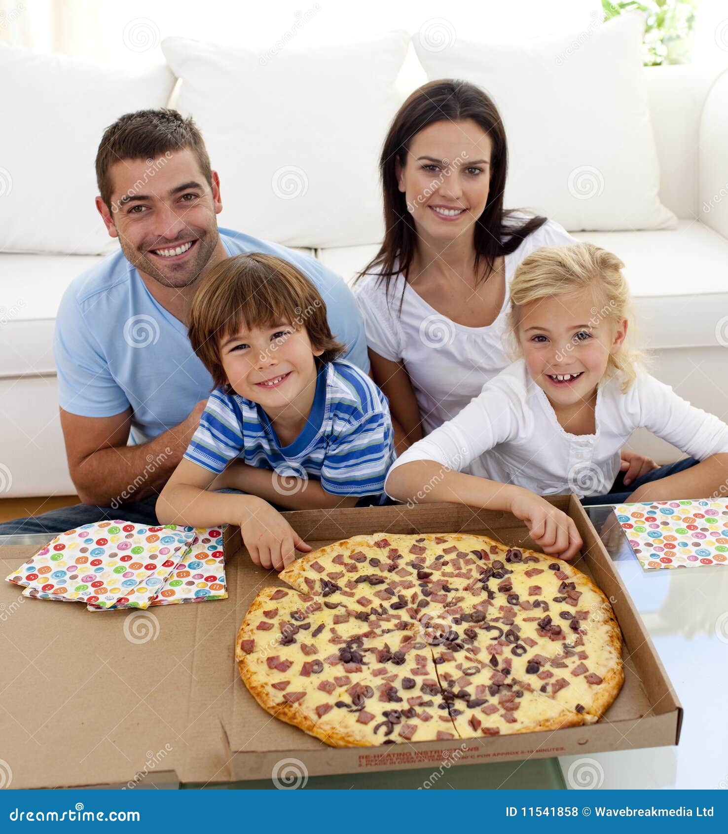 Family Eating Pizza on Sofa Stock Photo - Image of mother, eating: 11541858