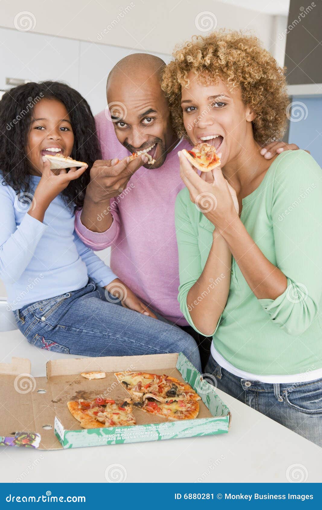 Family Eating Pizza Together Stock Image - Image of colour, home: 6880281