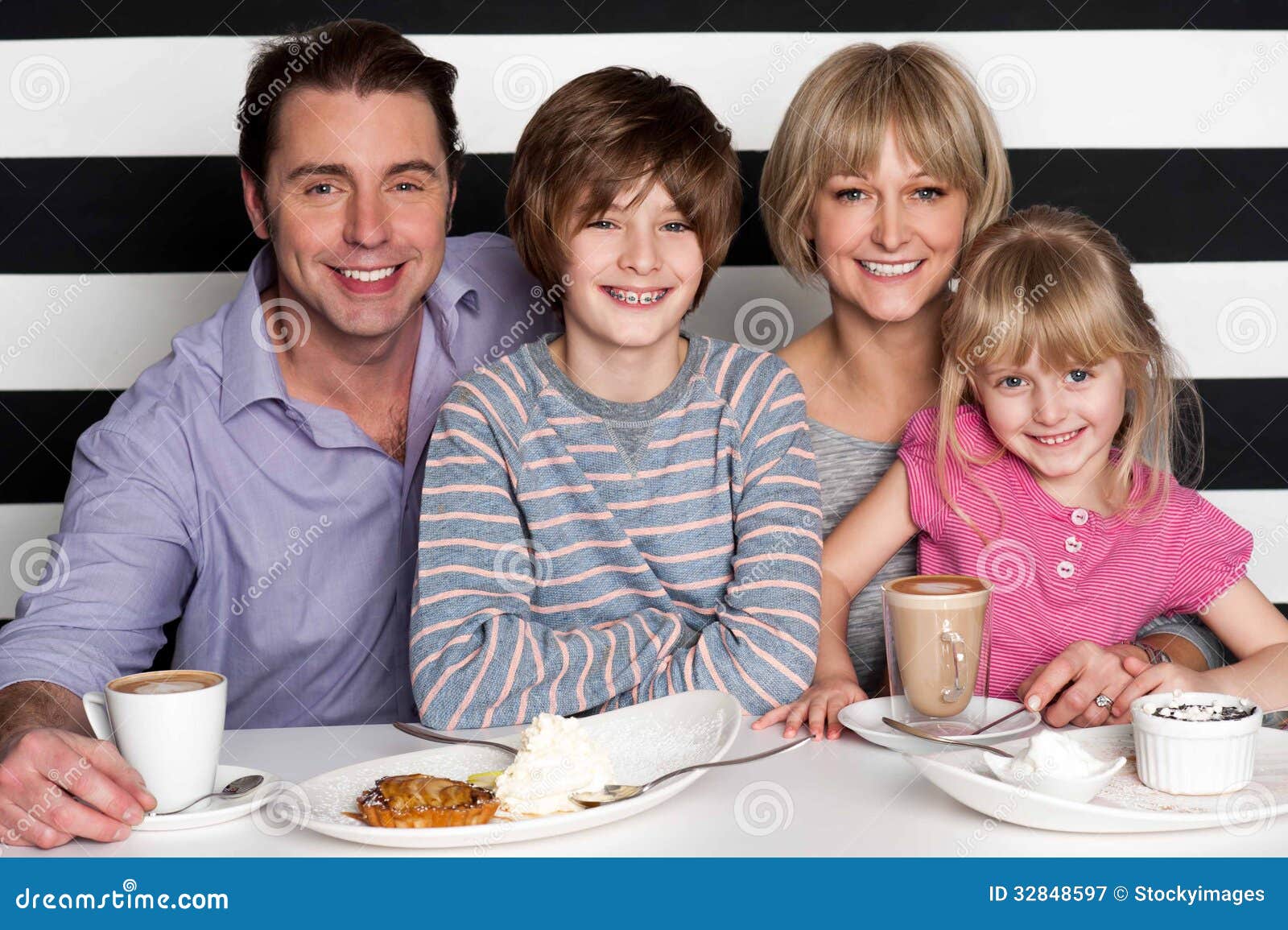 Family Enjoying Breakfast at Restaurant Stock Image - Image of children ...