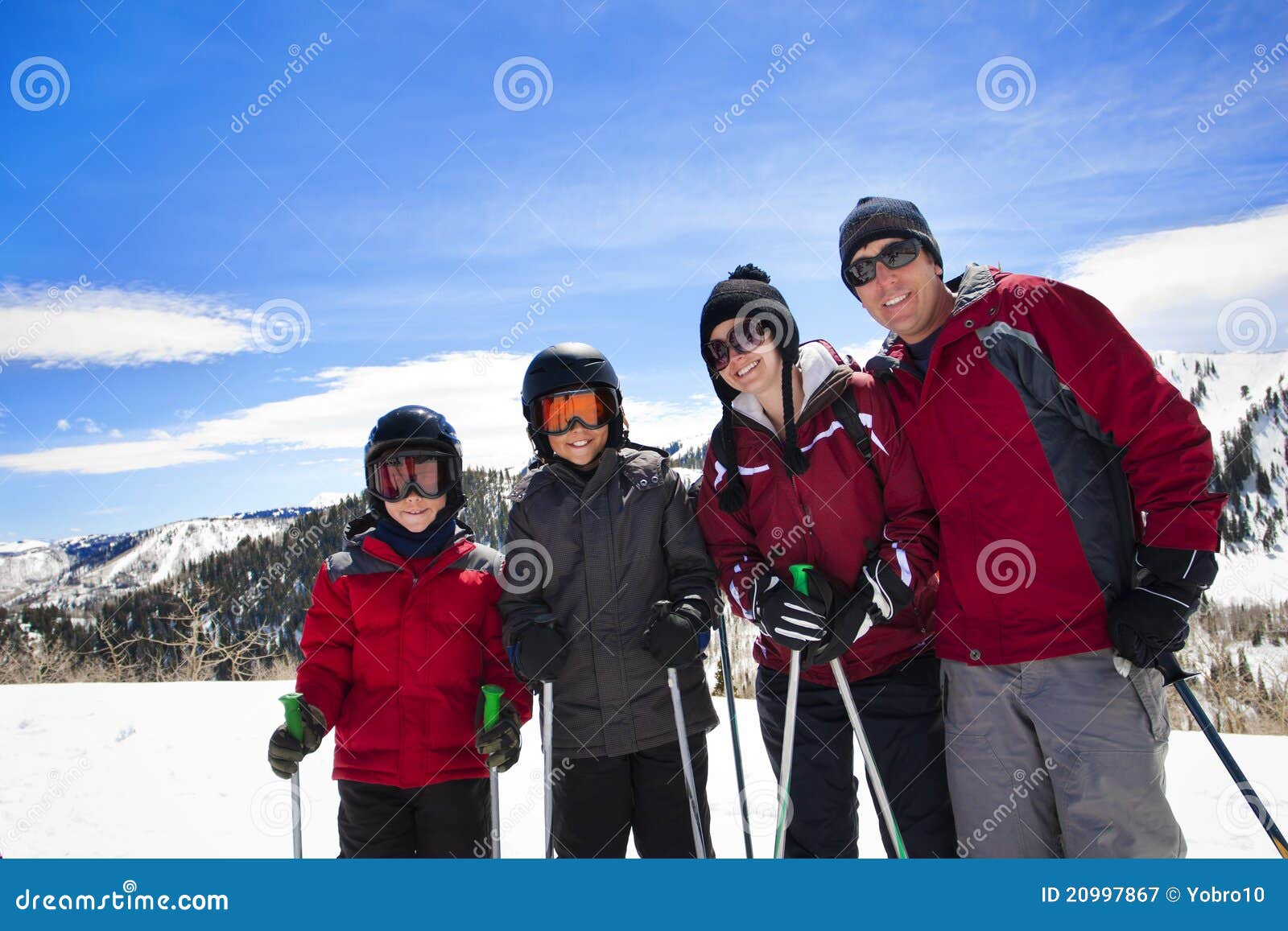 Family Enjoying a Day Skiing Together Stock Image - Image of nature ...