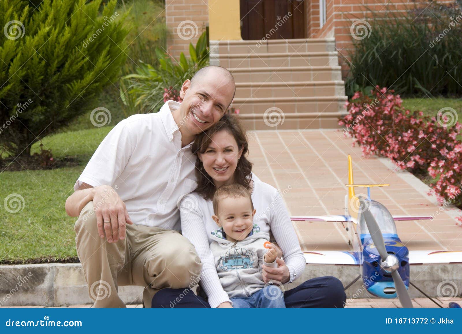 Family enjoying at home stock photo. Image of kids, flight - 18713772