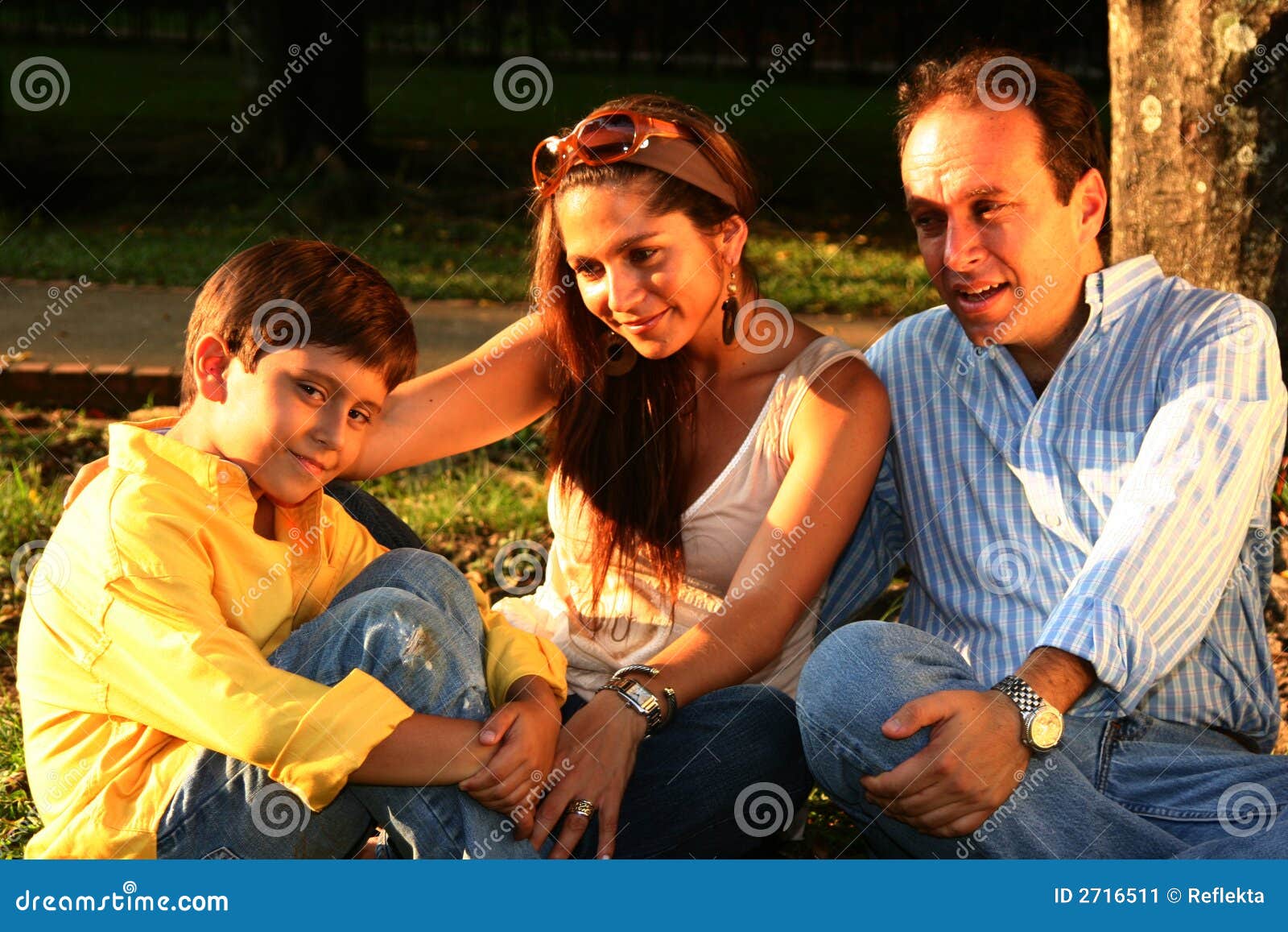A family enjoying together stock image. Image of field - 2716511