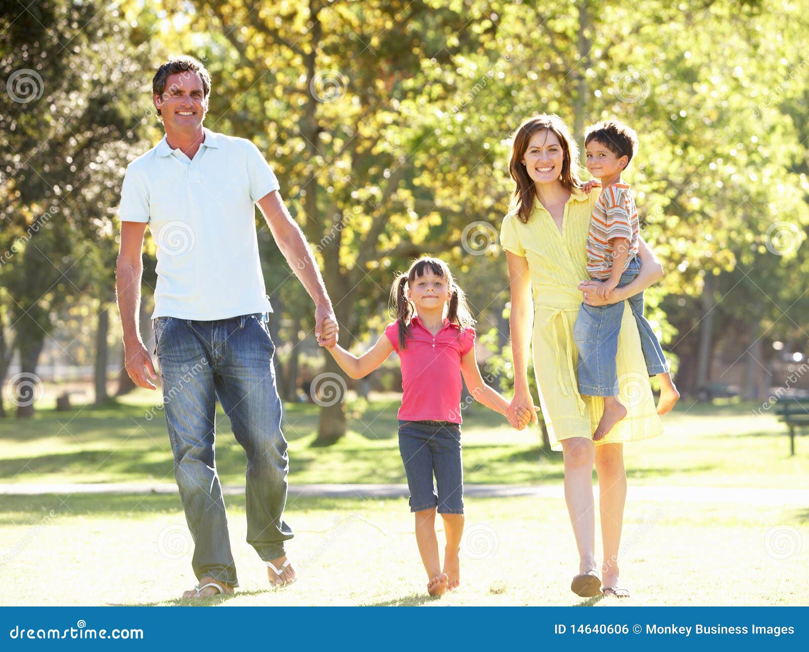 Family Enjoying Walk in Park Stock Photo - Image of portrait, people ...