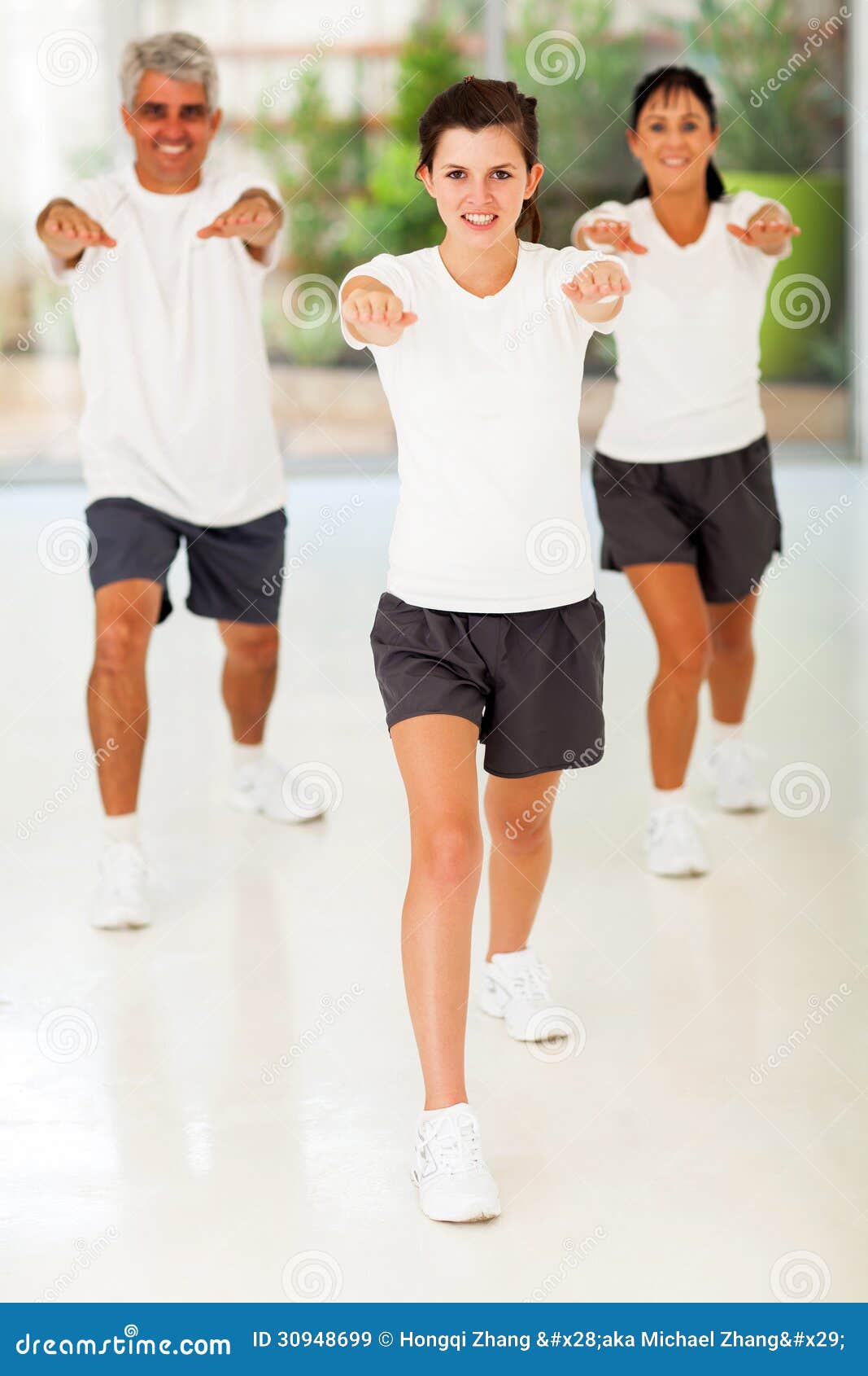 Family exercise indoors stock image. Image of pretty - 30948699