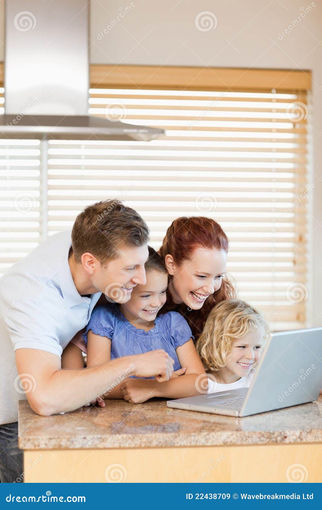 Family Exploring the Internet in the Kitchen Stock Image - Image of ...