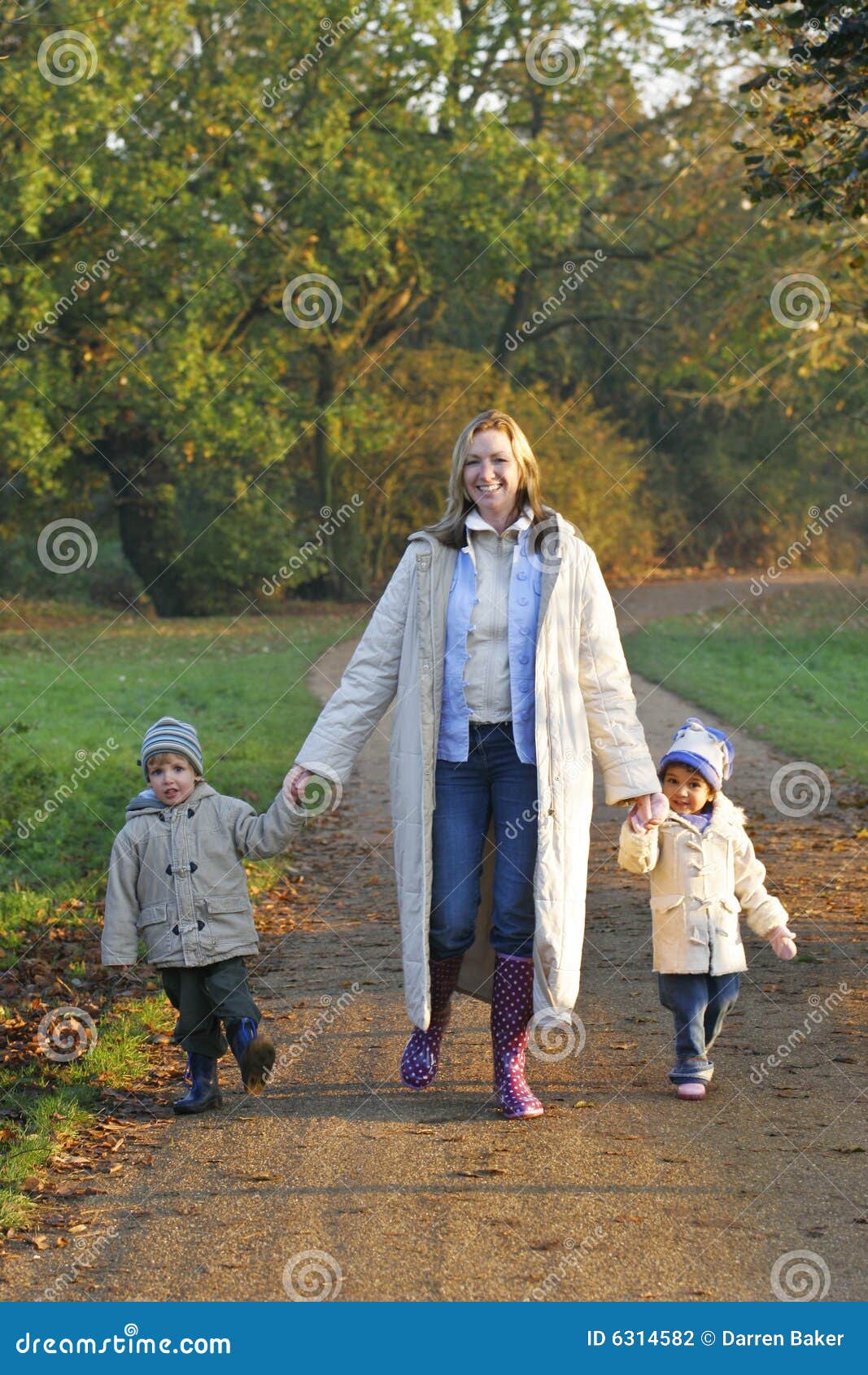 Family in the Fall stock photo. Image of fall, holding - 6314582