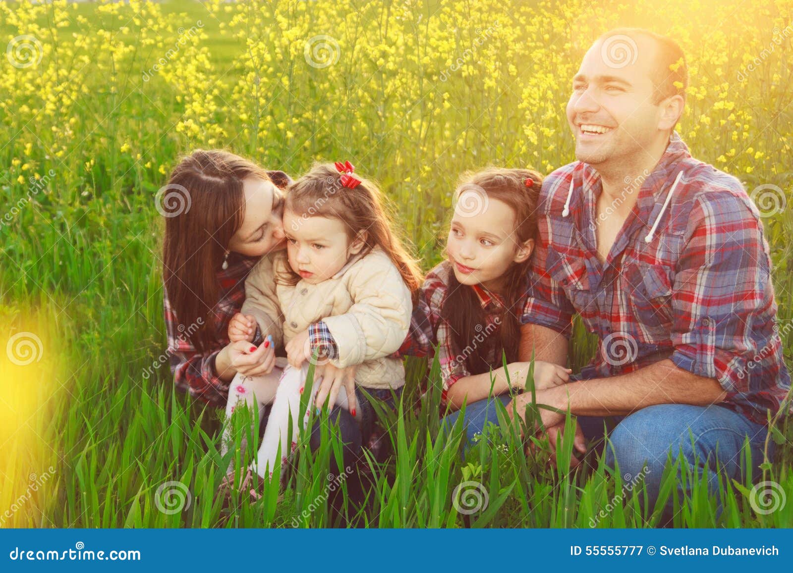 Family in the field. stock image. Image of laughing, male - 55555777