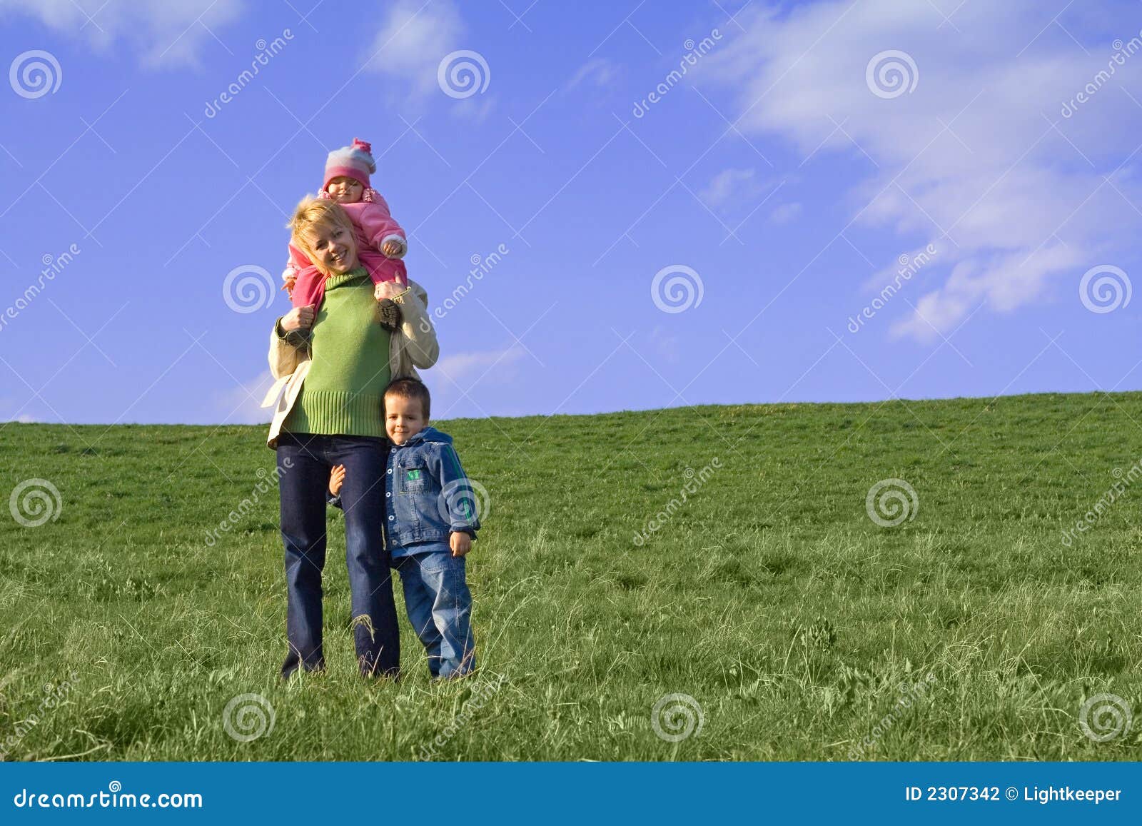 Family on the Field in Spring Stock Photo - Image of happy, relaxation ...